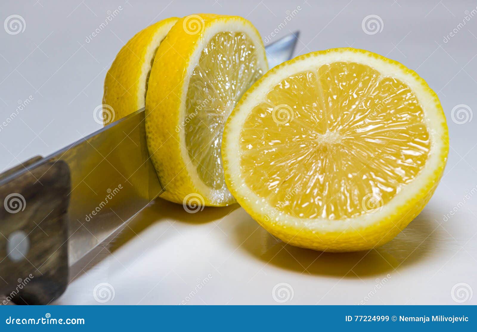 Cutting lemon stock image. Image of lemonade, juice, lemon - 77224999