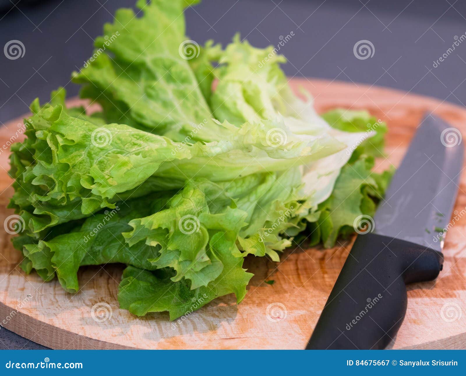 Cutting Lettuce on a Wooden Board Stock Image - Image of vegetable ...
