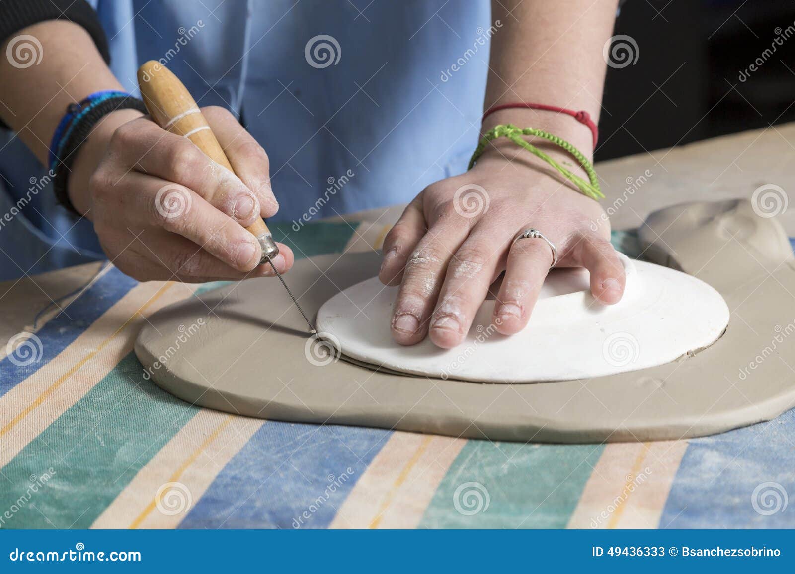 Cutting the mud stock image. Image of clay, tool, skill - 49436333