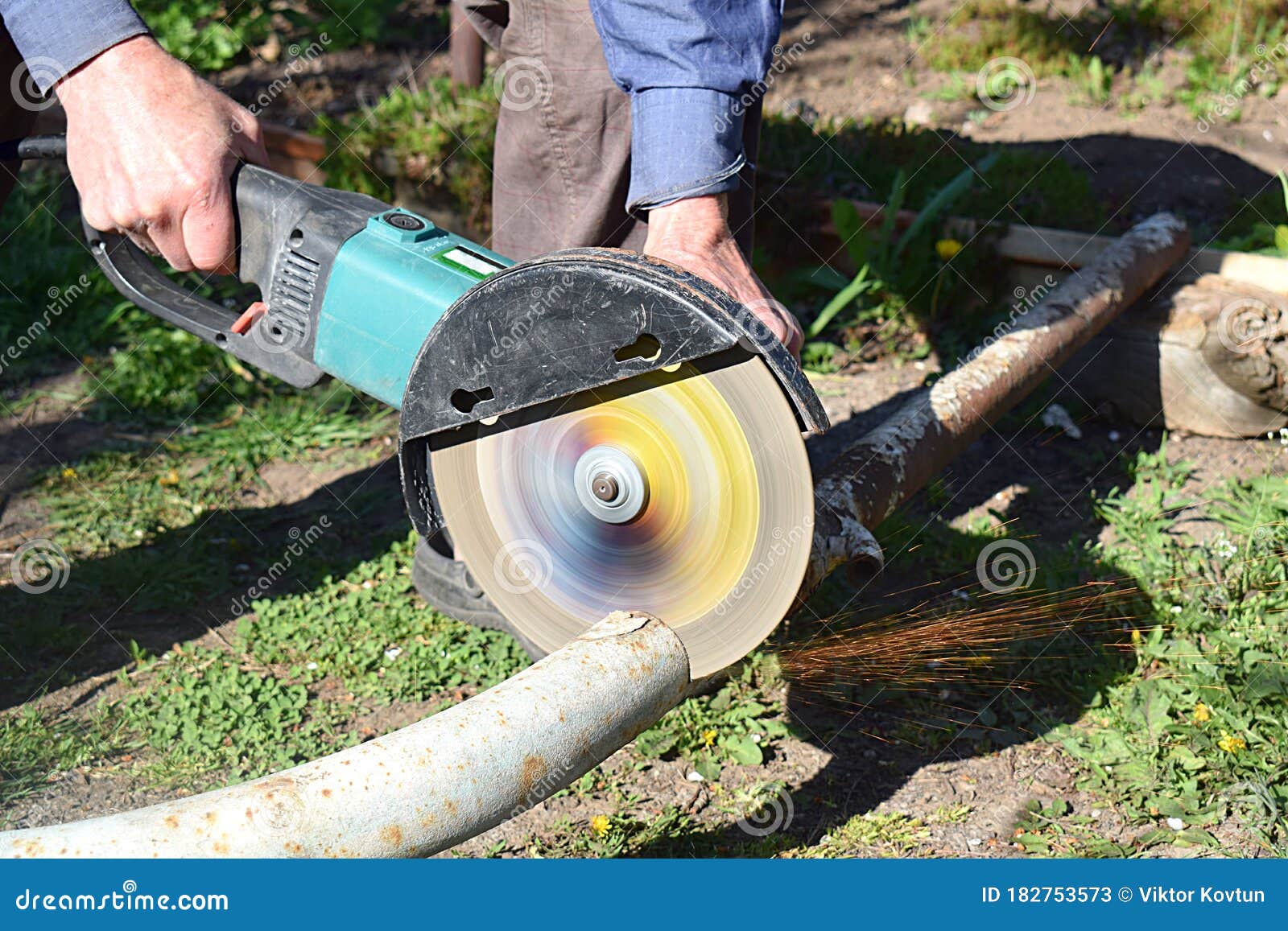 Worker Cuts Steel Pipe with Angle Grinder Stock Image - Image of ...