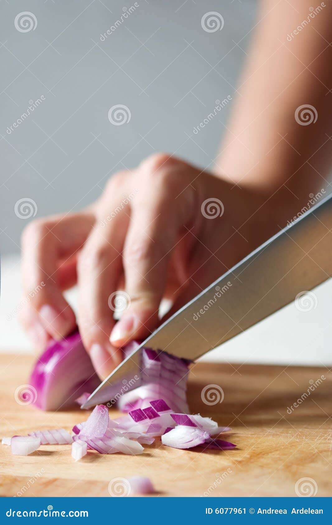 Cutting onion stock image. Image of vegetables, food, hand - 6077961