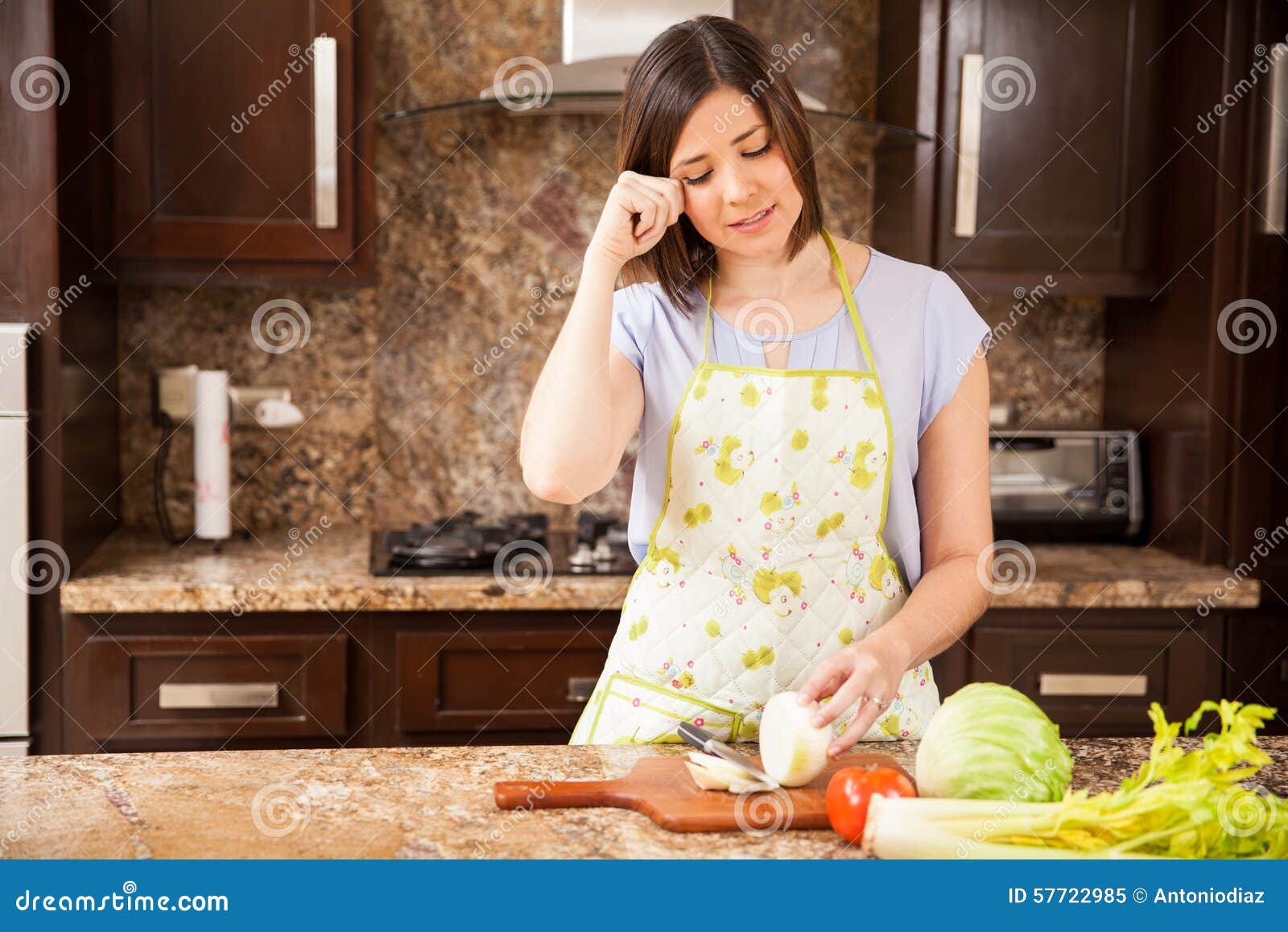Cutting onions and crying stock image. Image of indoor - 57722985