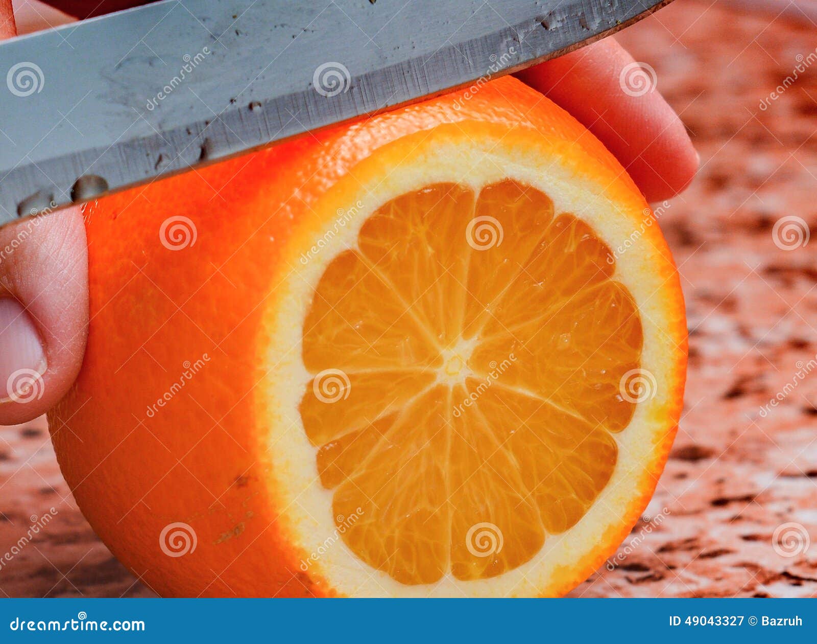 Cutting of orange stock image. Image of orange, hands - 49043327