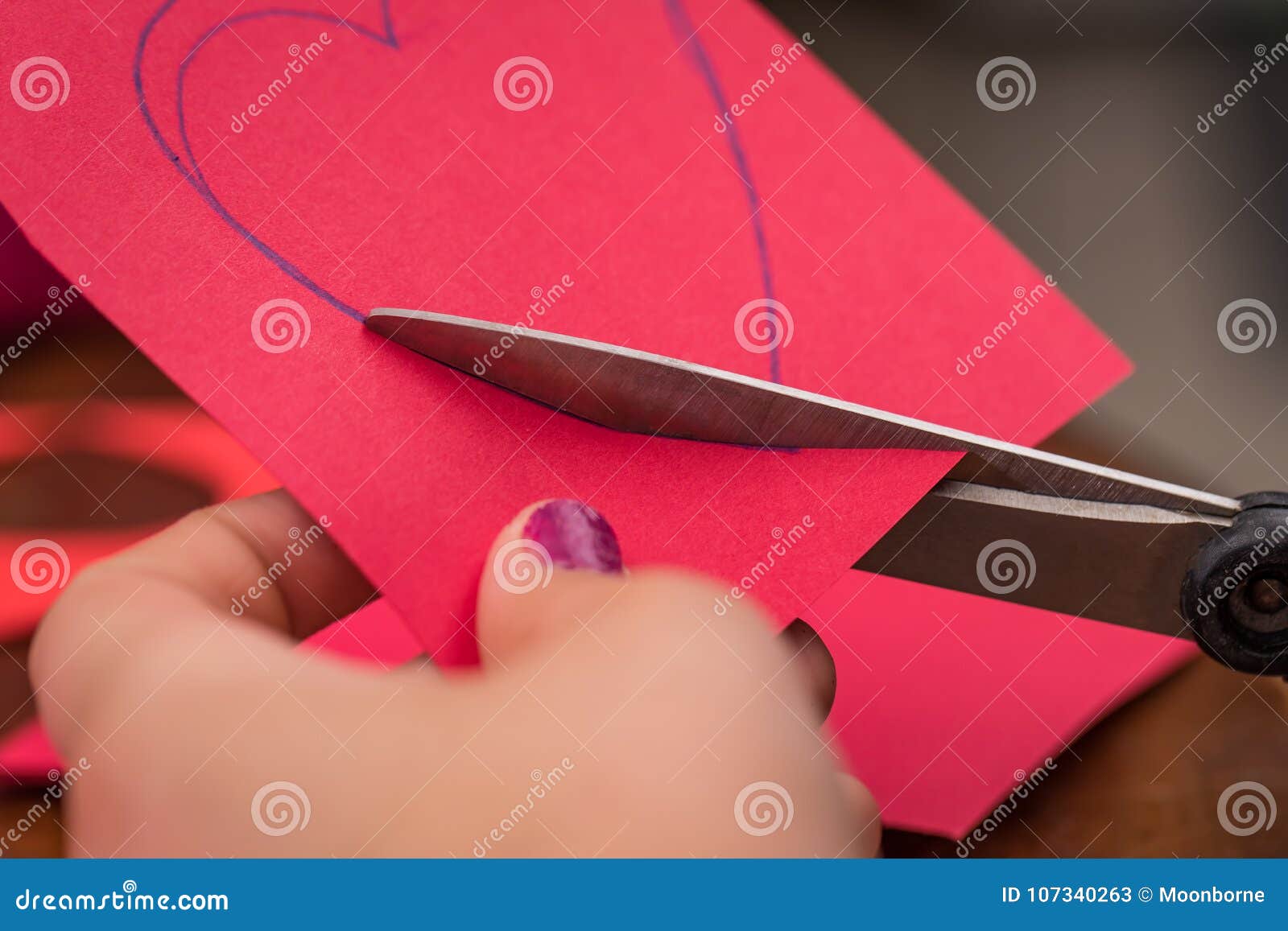 Cutting out a Heart stock image. Image of passion, finger - 107340263