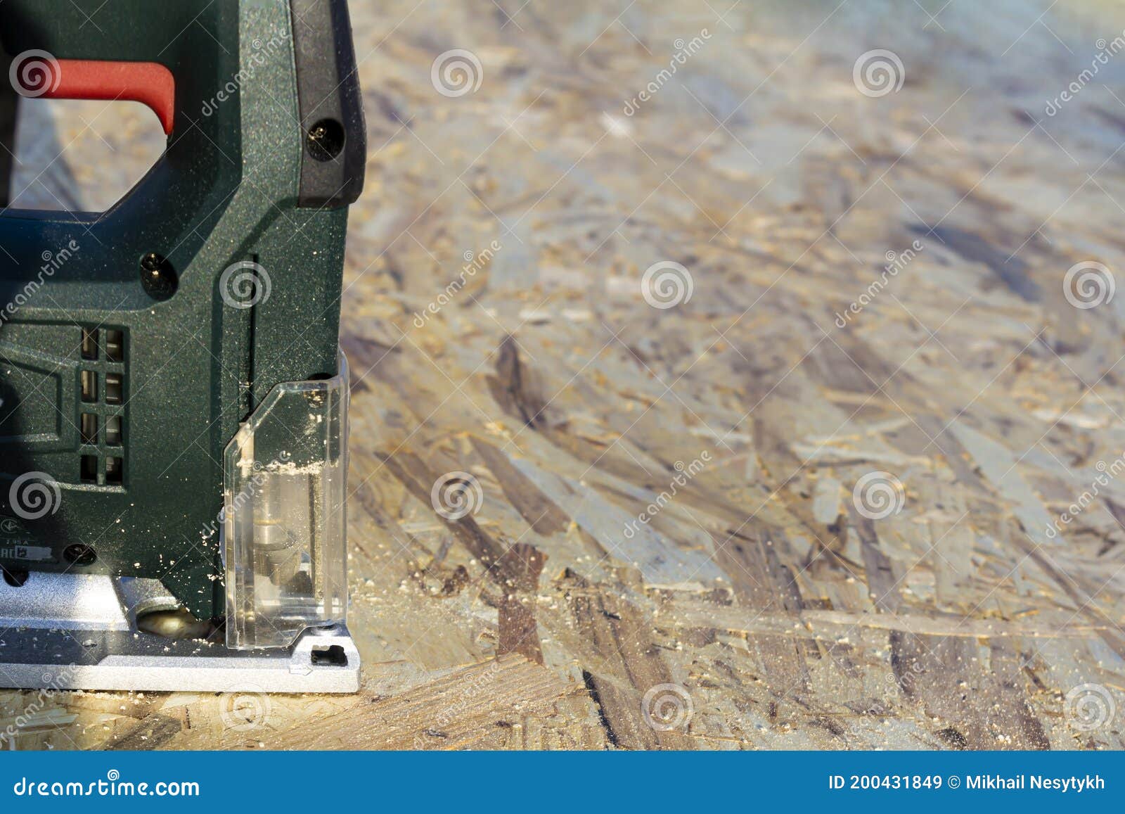 Cutting Out an OSB Sheet with a Jigsaw. Stock Image - Image of ...