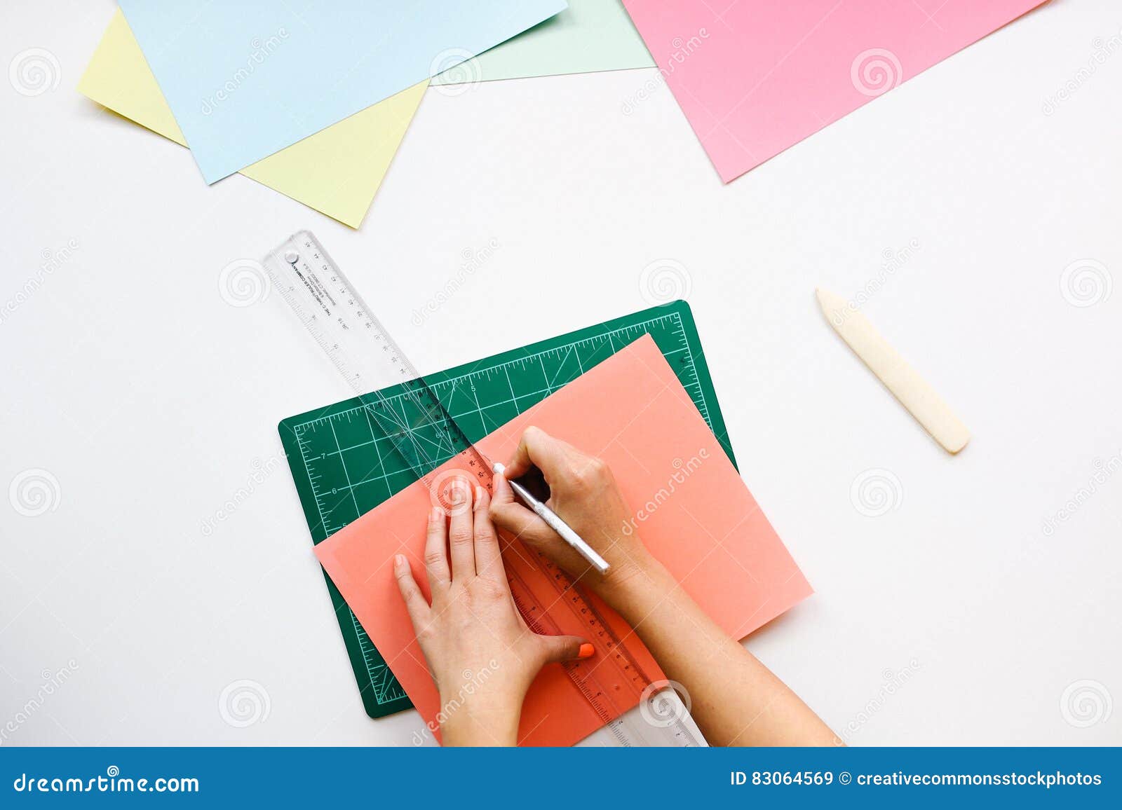 Cutting Paper On Ruled Pad Picture. Image: 83064569