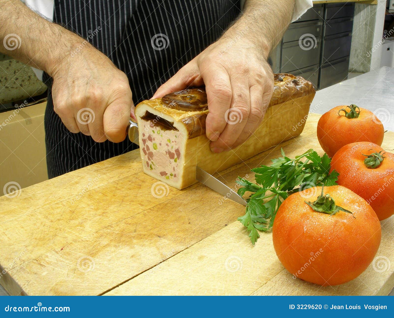 Cutting a pate in slices stock photo. Image of gastronomy - 3229620