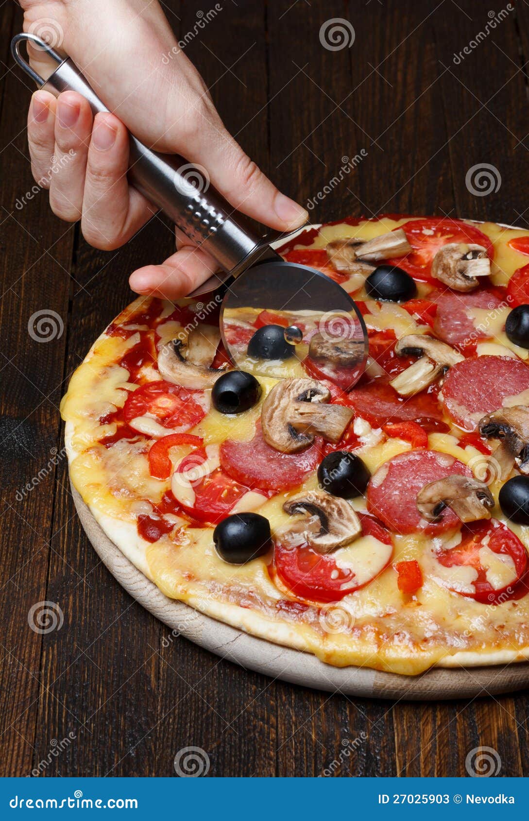 Cutting pizza stock image. Image of bake, rosemary, dinner - 27025903