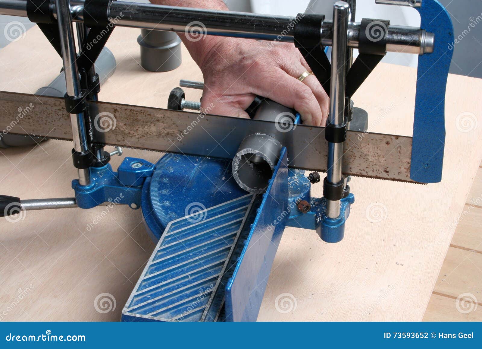 Cutting pvc pipe stock photo. Image of flow, handyman - 73593652