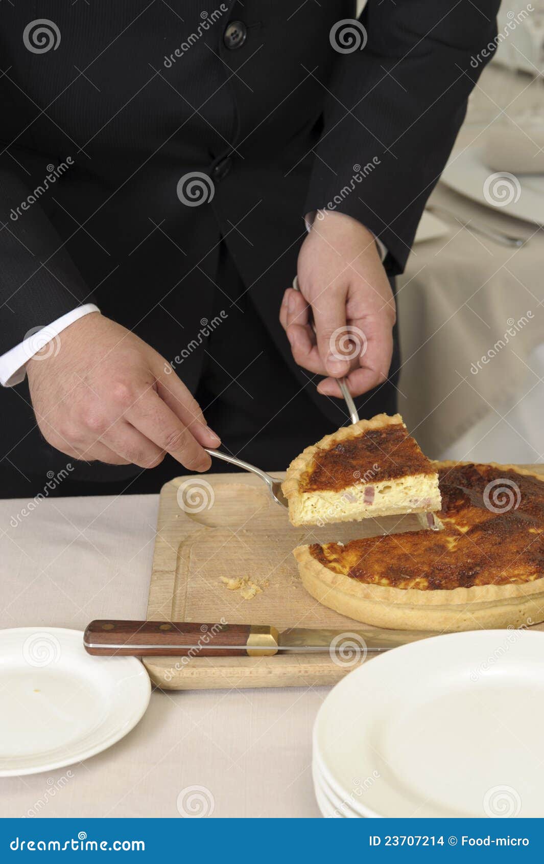Cutting a quiche stock photo. Image of classical, lorraine - 23707214