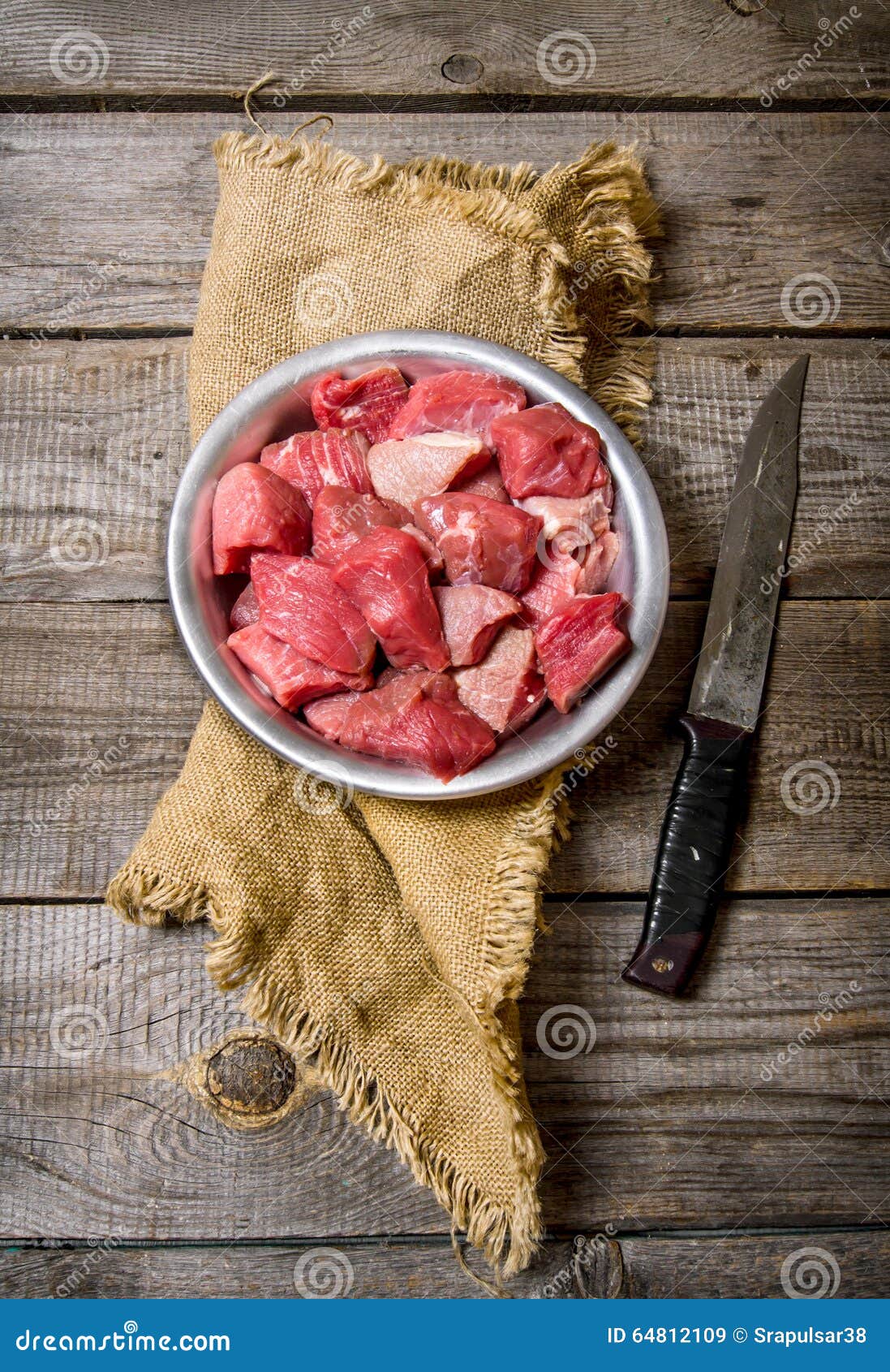 Cutting Raw Meat a Large Knife. on Wooden Table. Stock Image - Image of ...