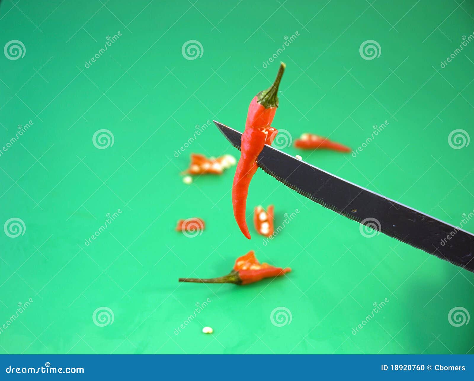 Cutting a Red Chilly Pepper Stock Photo - Image of spanish, cooking ...