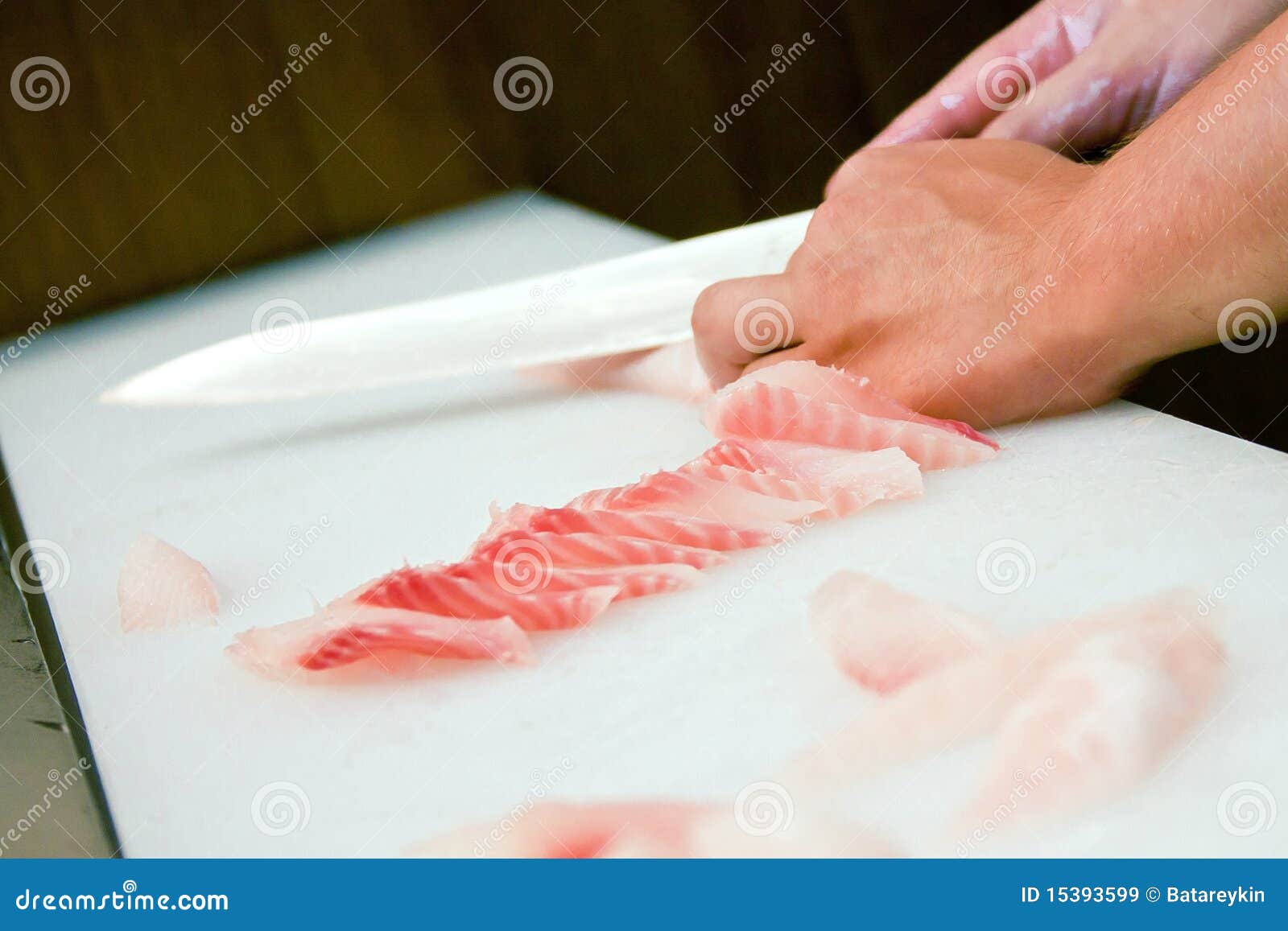 Cutting red fish knife stock image. Image of blade, meat - 15393599
