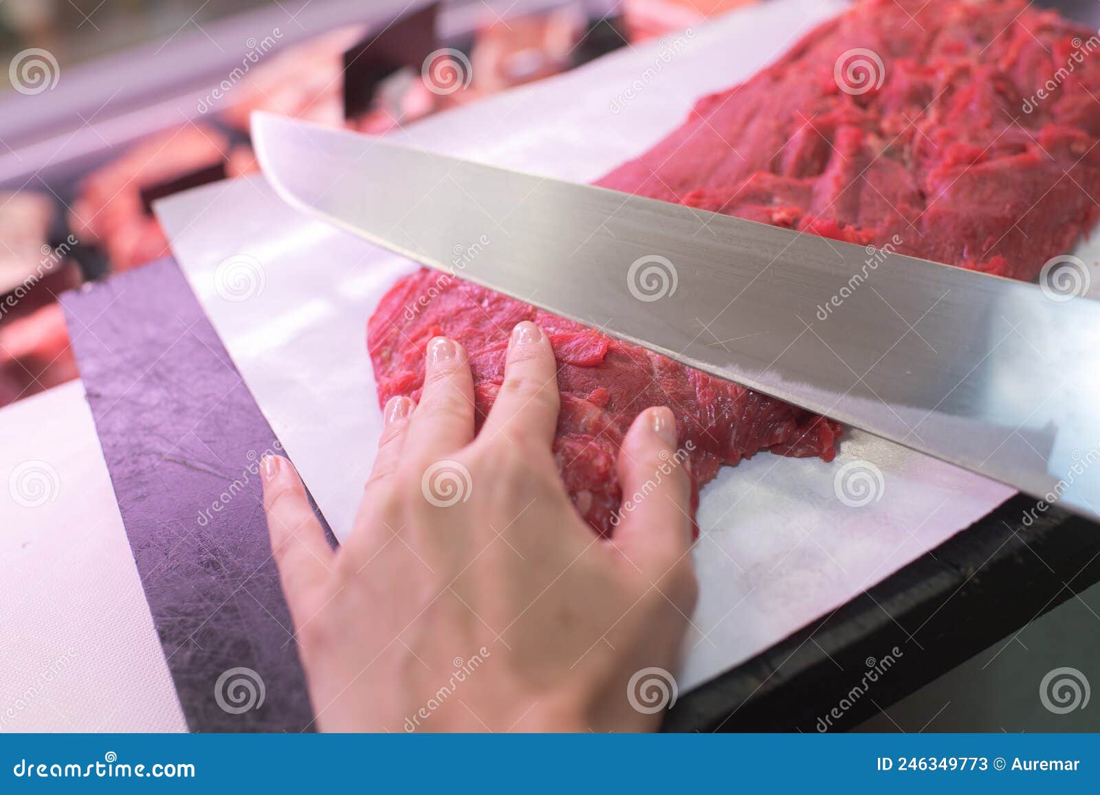 Cutting a red meat stock image. Image of weight, hand - 246349773