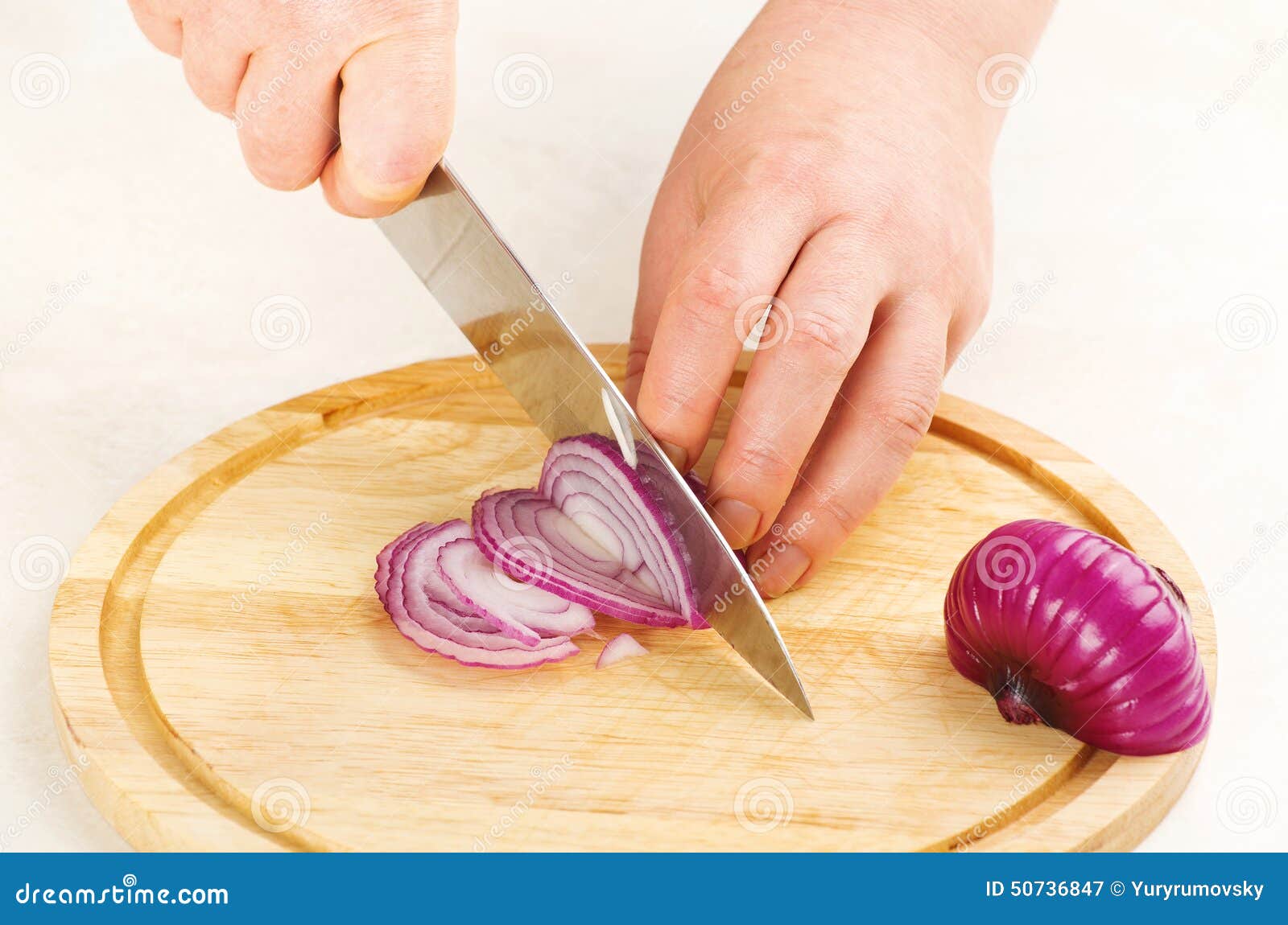 Cutting red onion stock image. Image of food, fresh, hand - 50736847