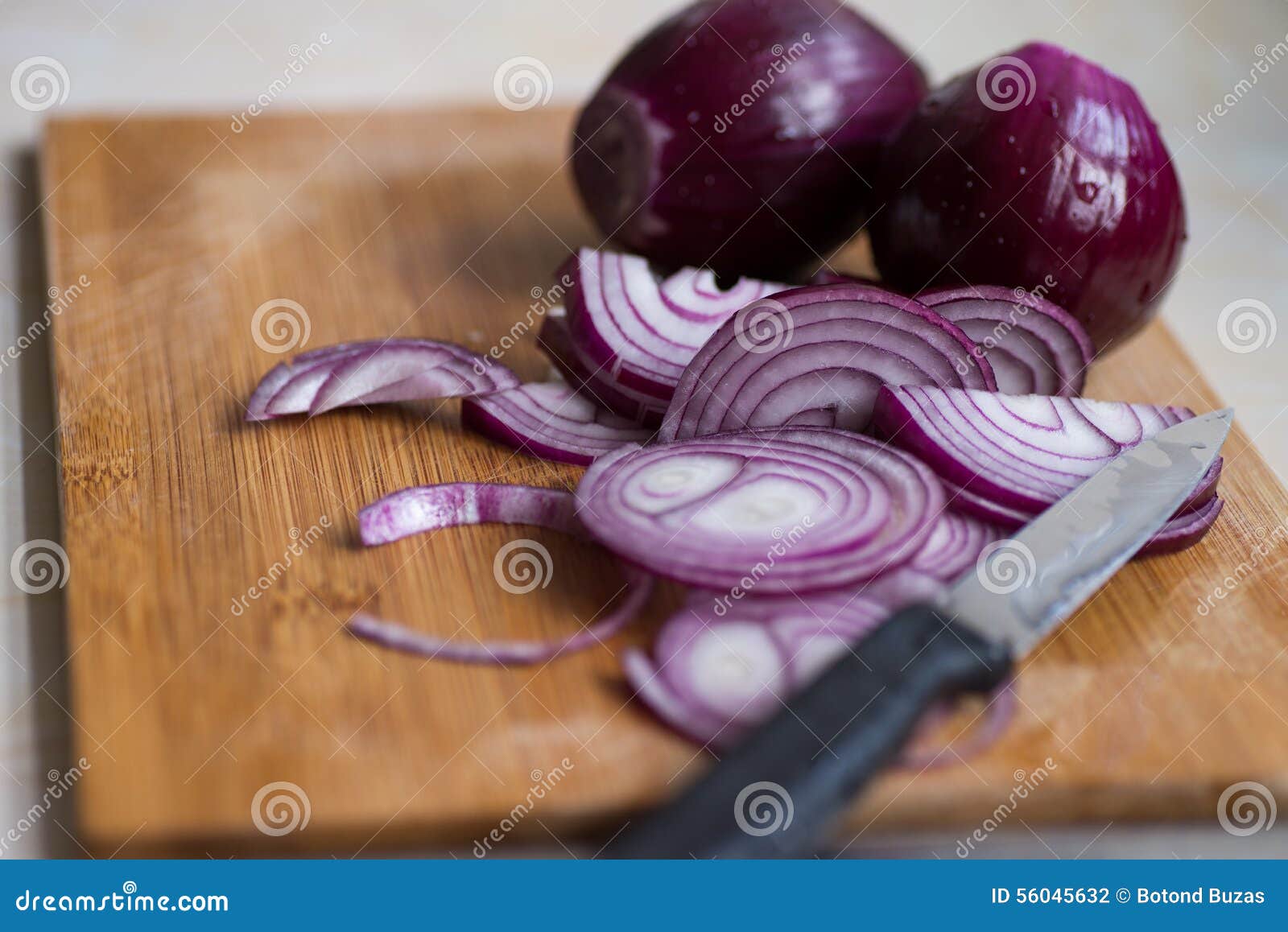 Cutting red onions stock photo. Image of onion, chopping - 56045632