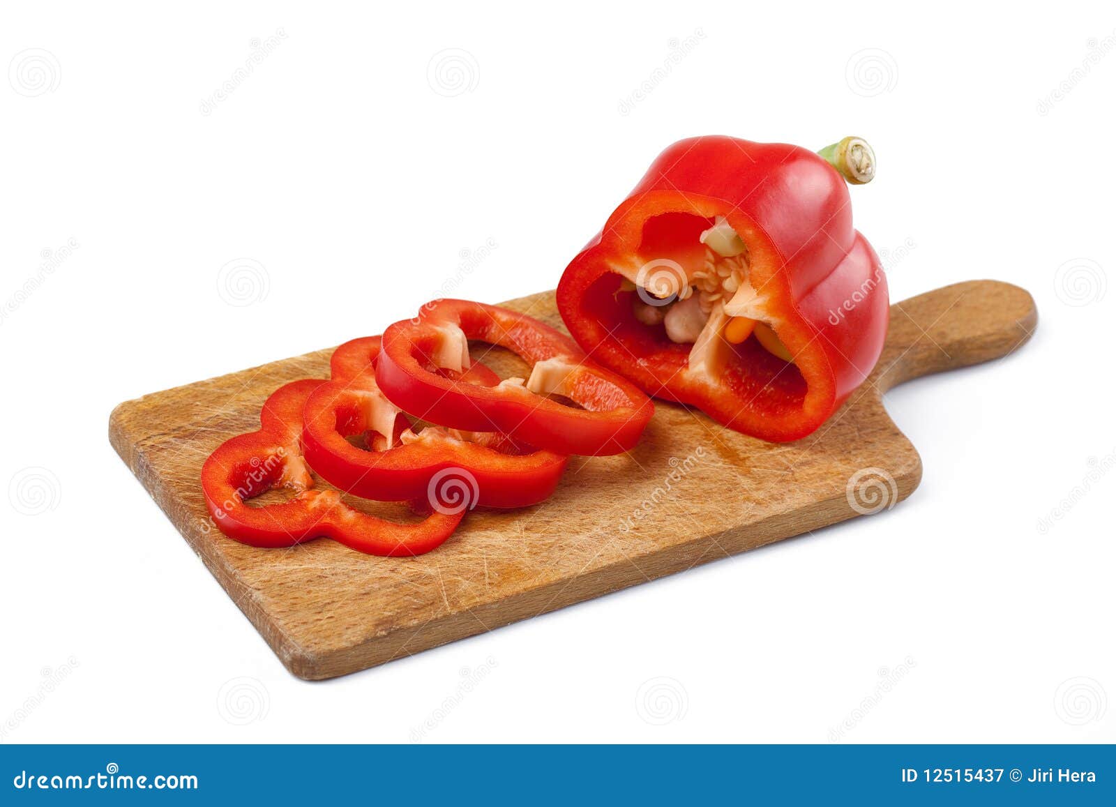 Cutting red pepper on wood stock image. Image of bell - 12515437
