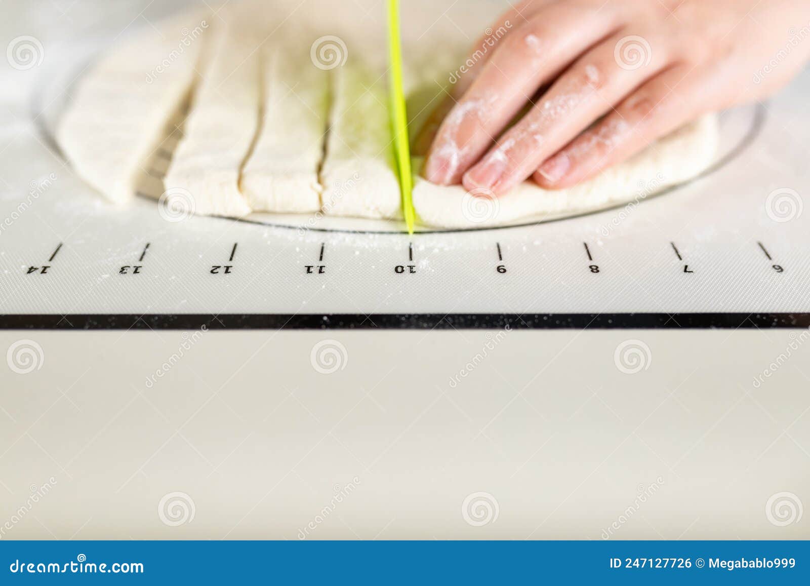 Cutting the Rolled Dough into Equal Parts According To the Markup, Copy ...
