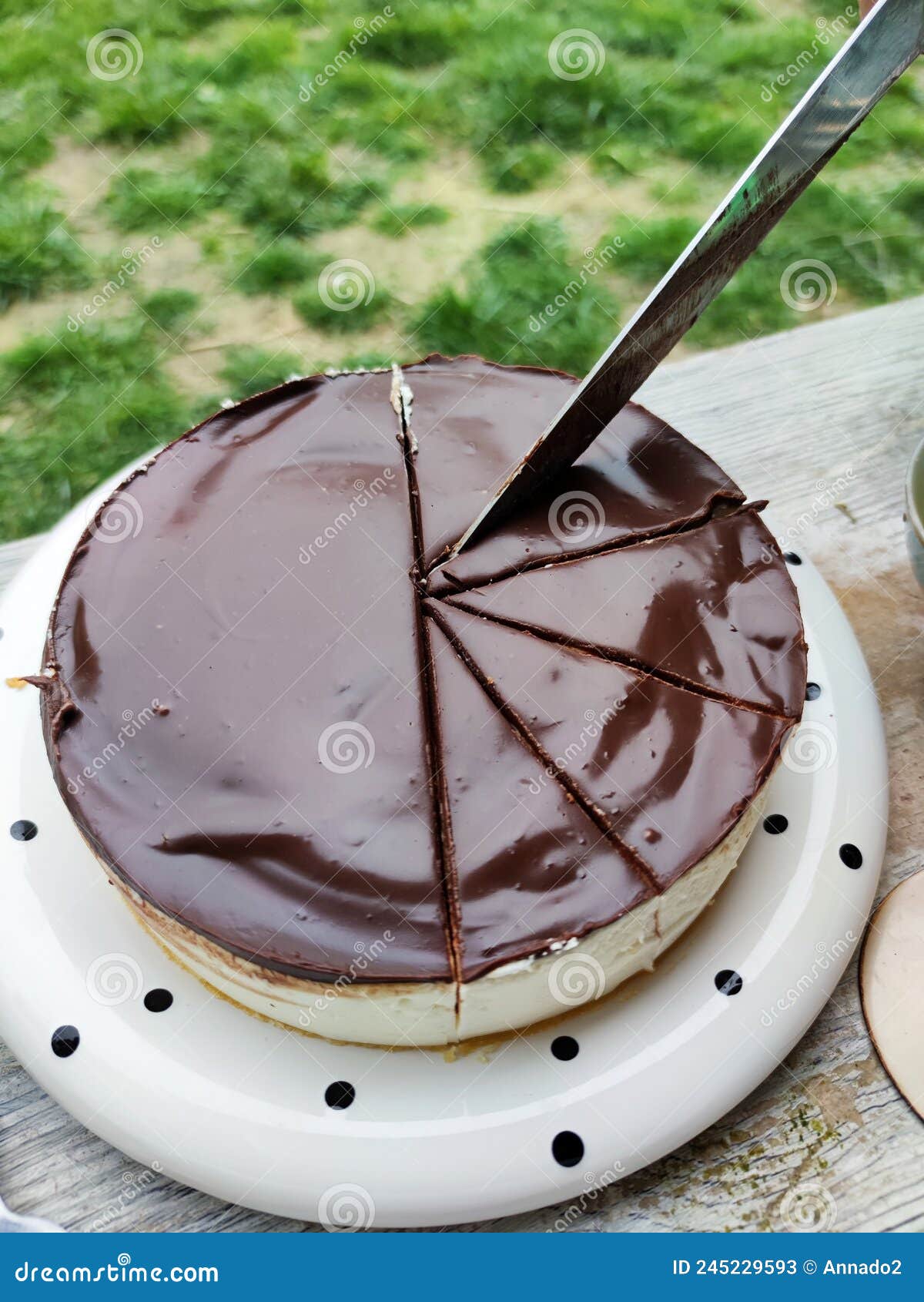 Cutting Round Creamy Chocolate Cheesecake into Pieces Stock Image ...