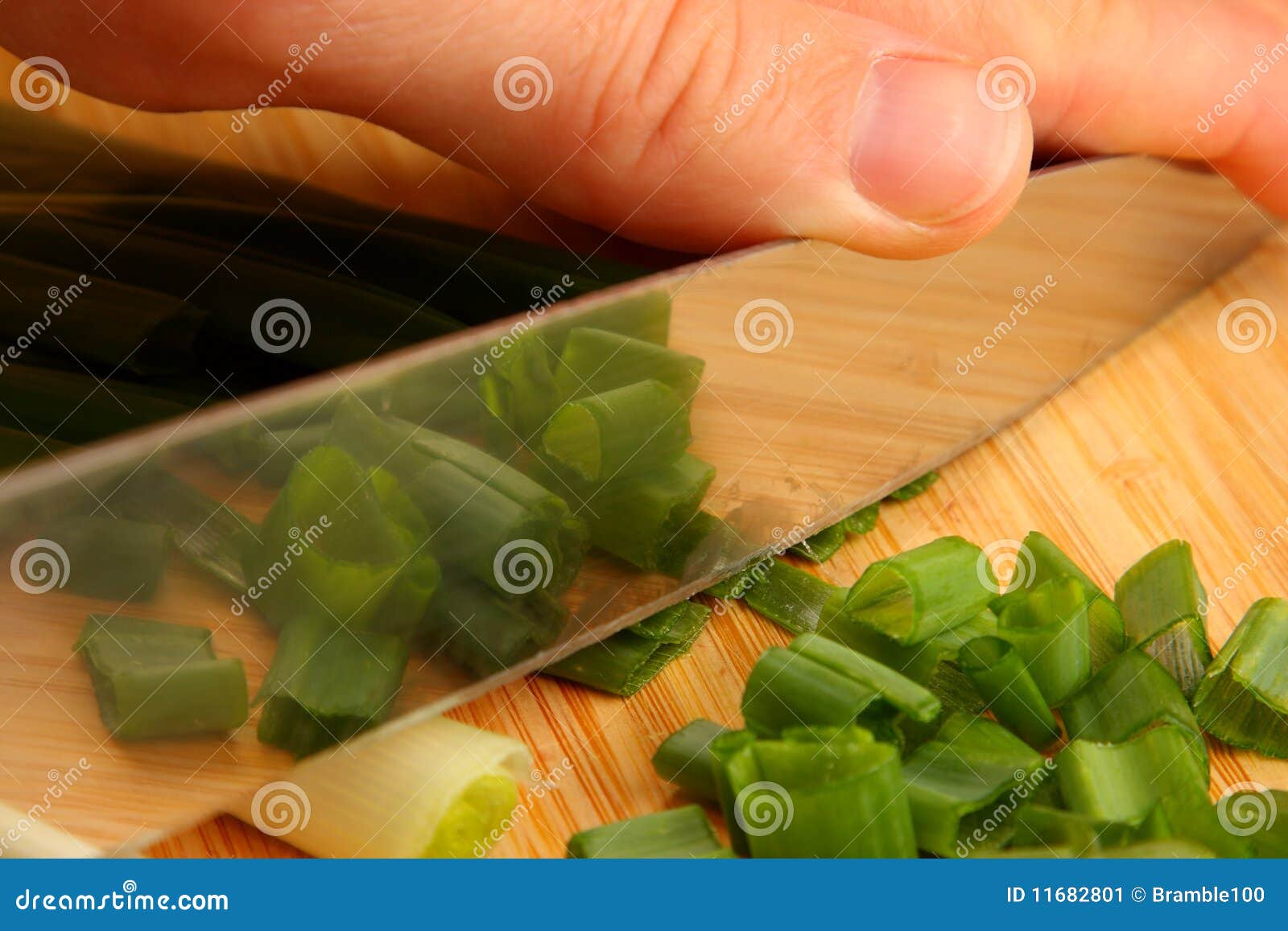 Cutting spring onions stock image. Image of healthy, ingredient - 11682801