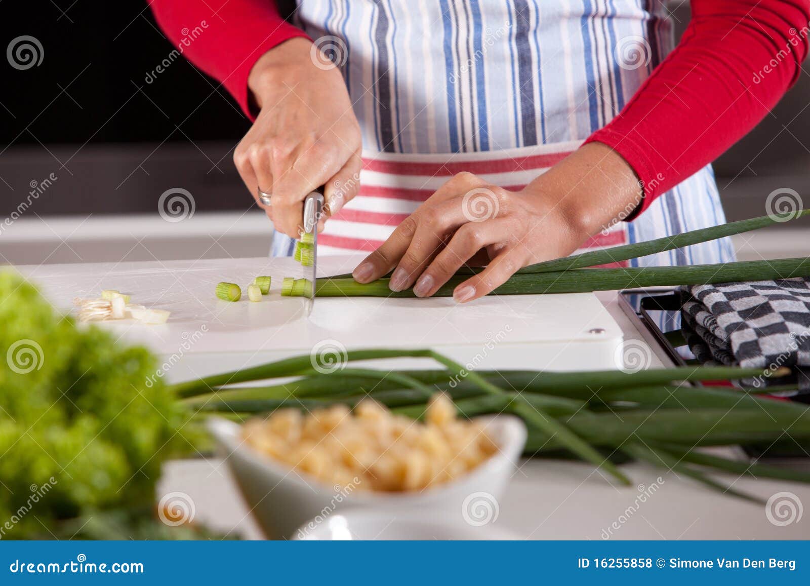 Cutting the spring onions stock photo. Image of cutting - 16255858