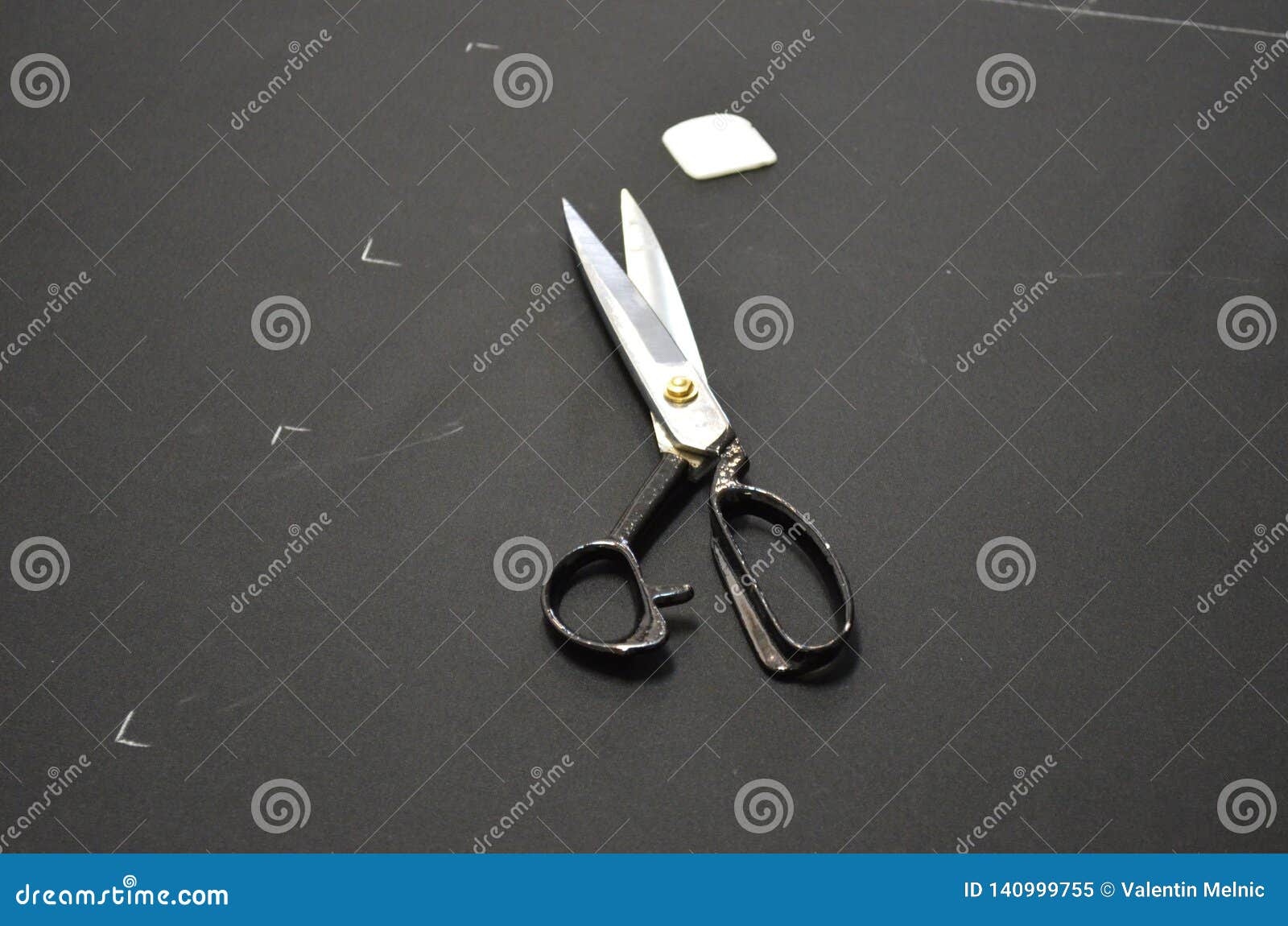 Cutting Table, Lined Fabric and Scissors Stock Image - Image of ...