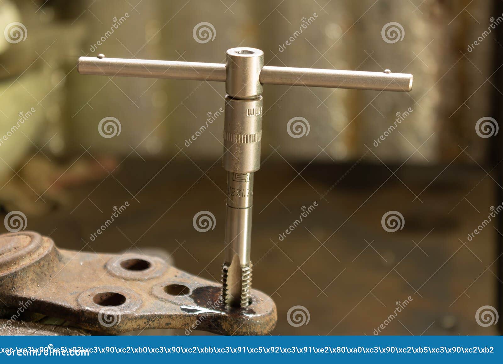 Cutting a Thread in a Hole with a Tap by Hand. Material High Speed ...