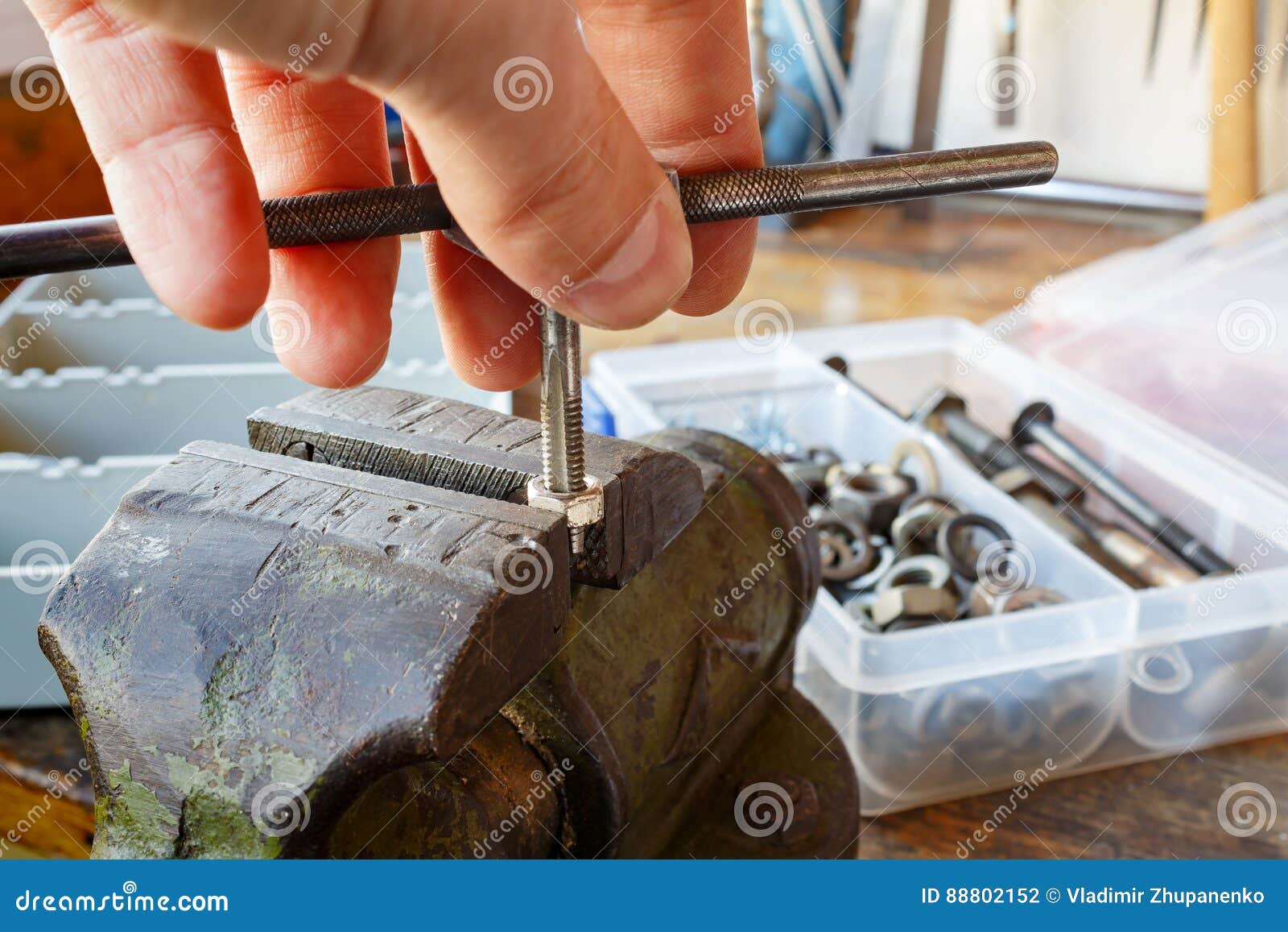Cutting Thread Nuts with the Machine Tap Stock Photo - Image of ...