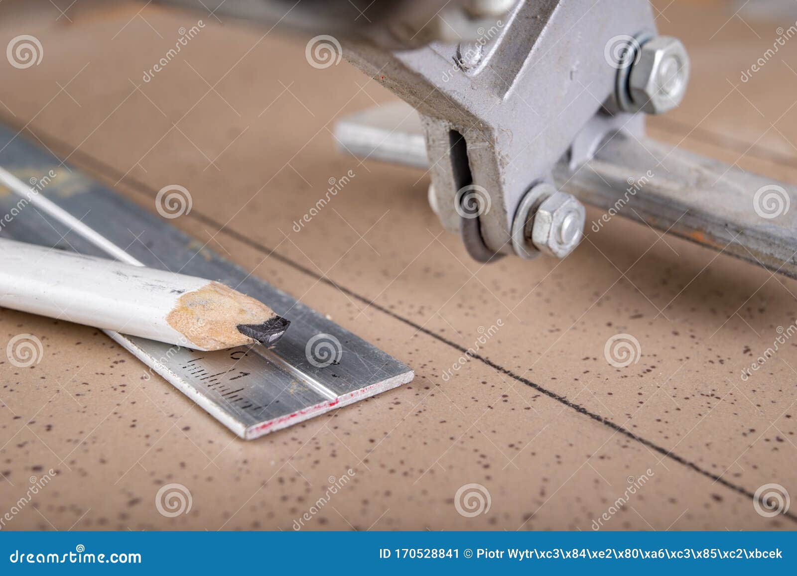Cutting Tiles in a Home Workshop. Tiling Work on a Workshop Table Stock ...