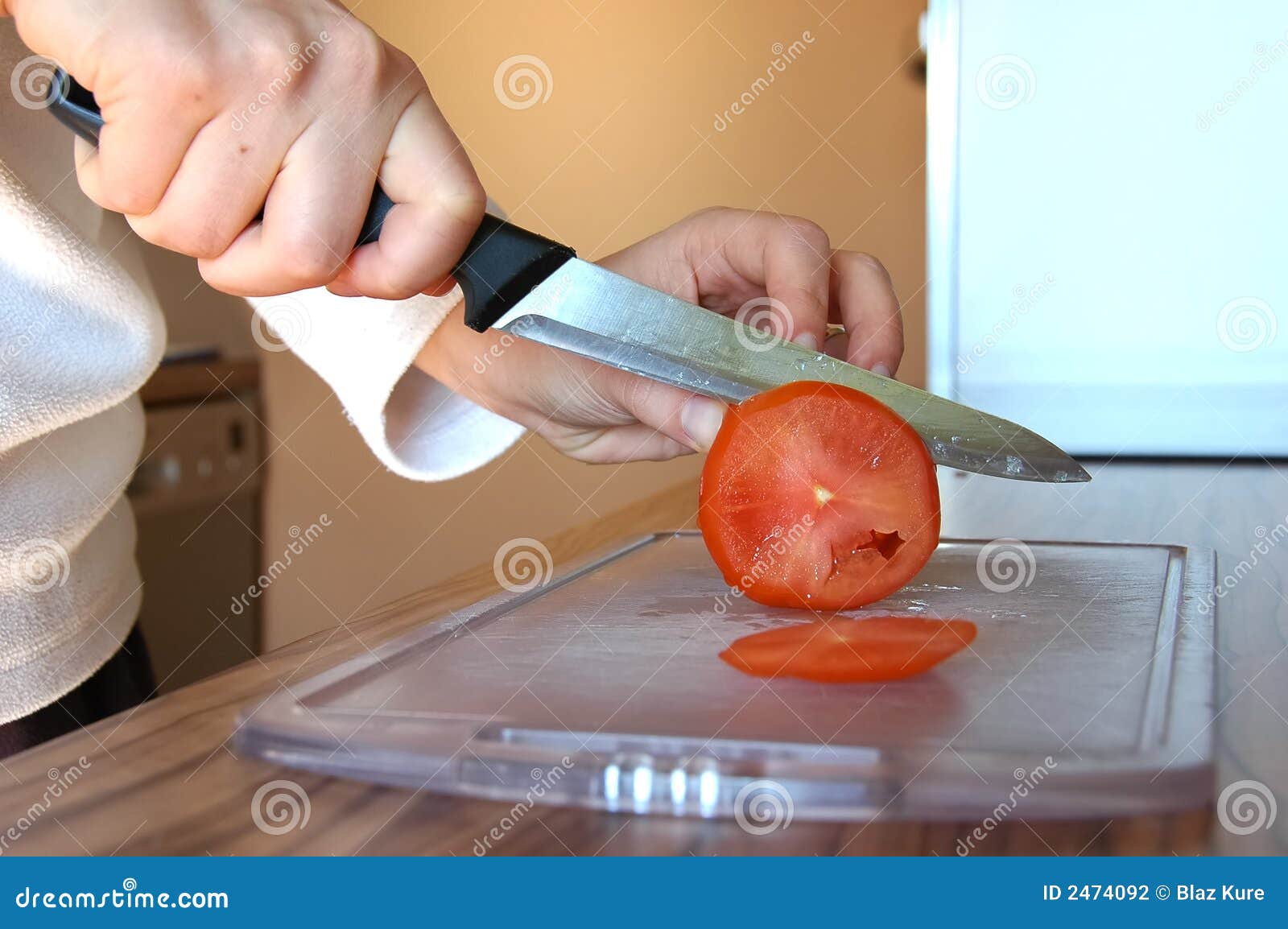 Cutting Tomato stock photo. Image of prepare, tomato, chef - 2474092