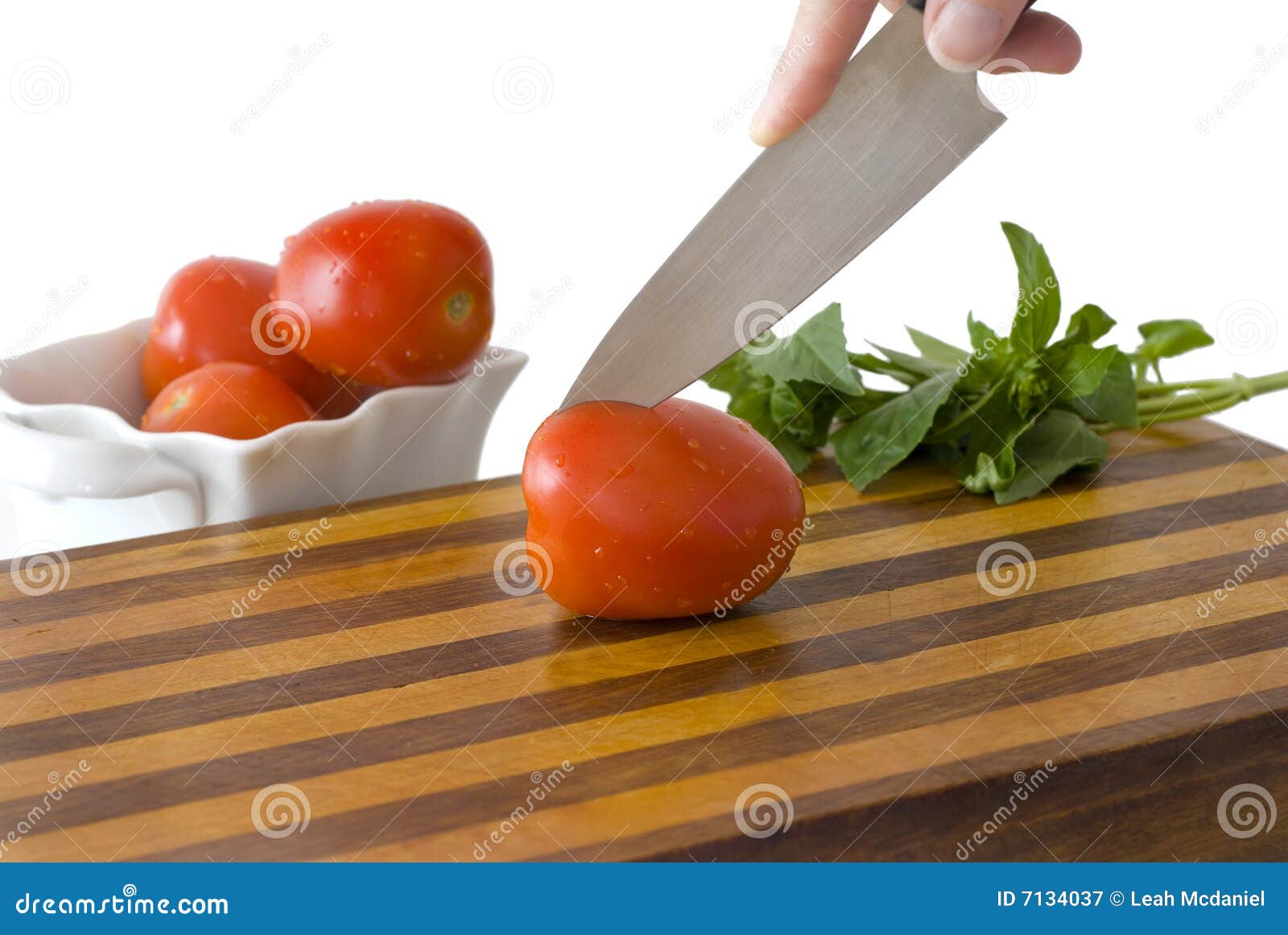 Cutting a Tomato stock image. Image of cook, dish, meal - 7134037