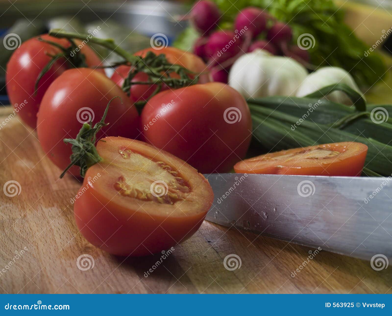 Cutting Tomatoes stock image. Image of life, health, kitchen - 563925