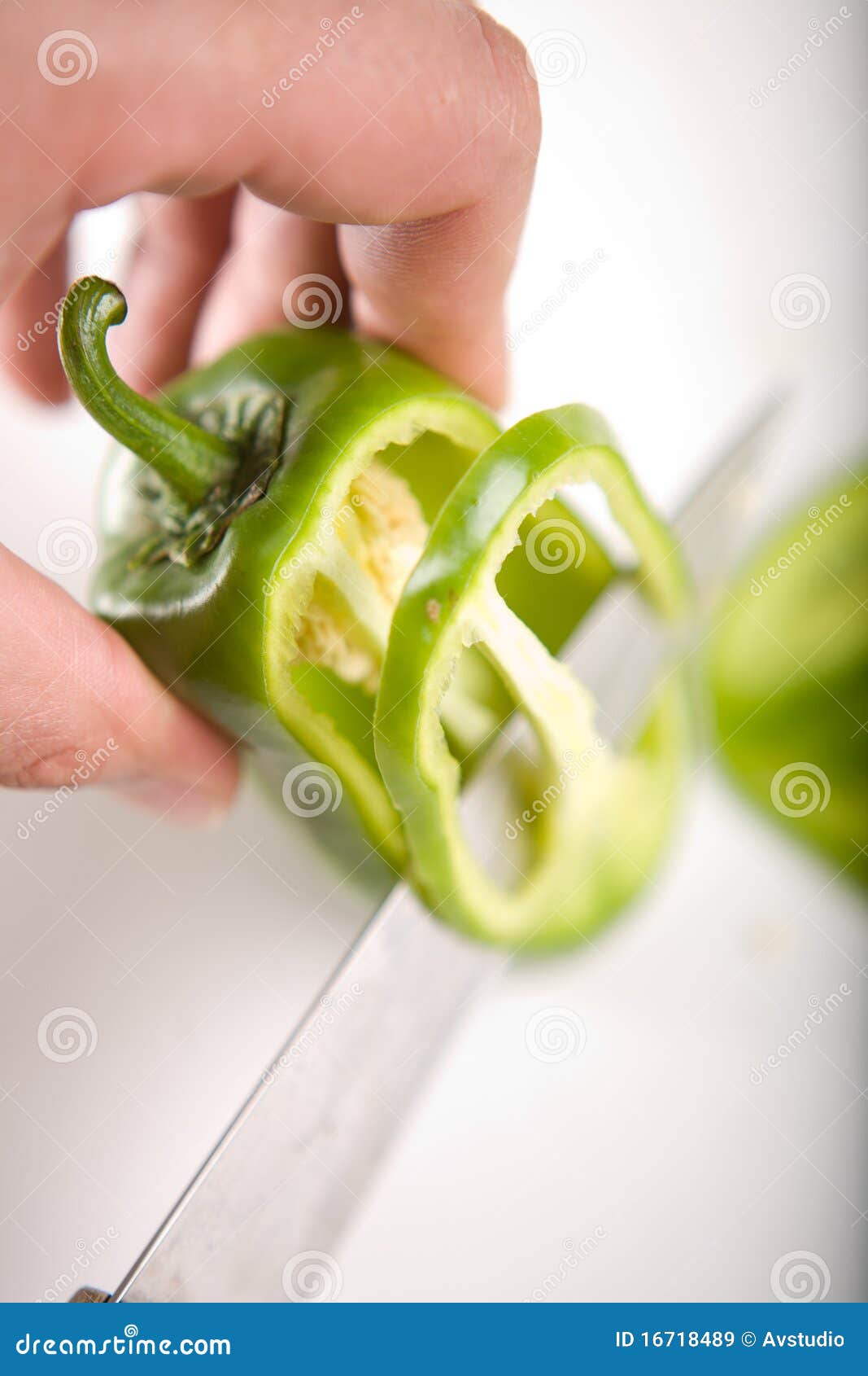 Cutting vegetables stock image. Image of hand, green - 16718489
