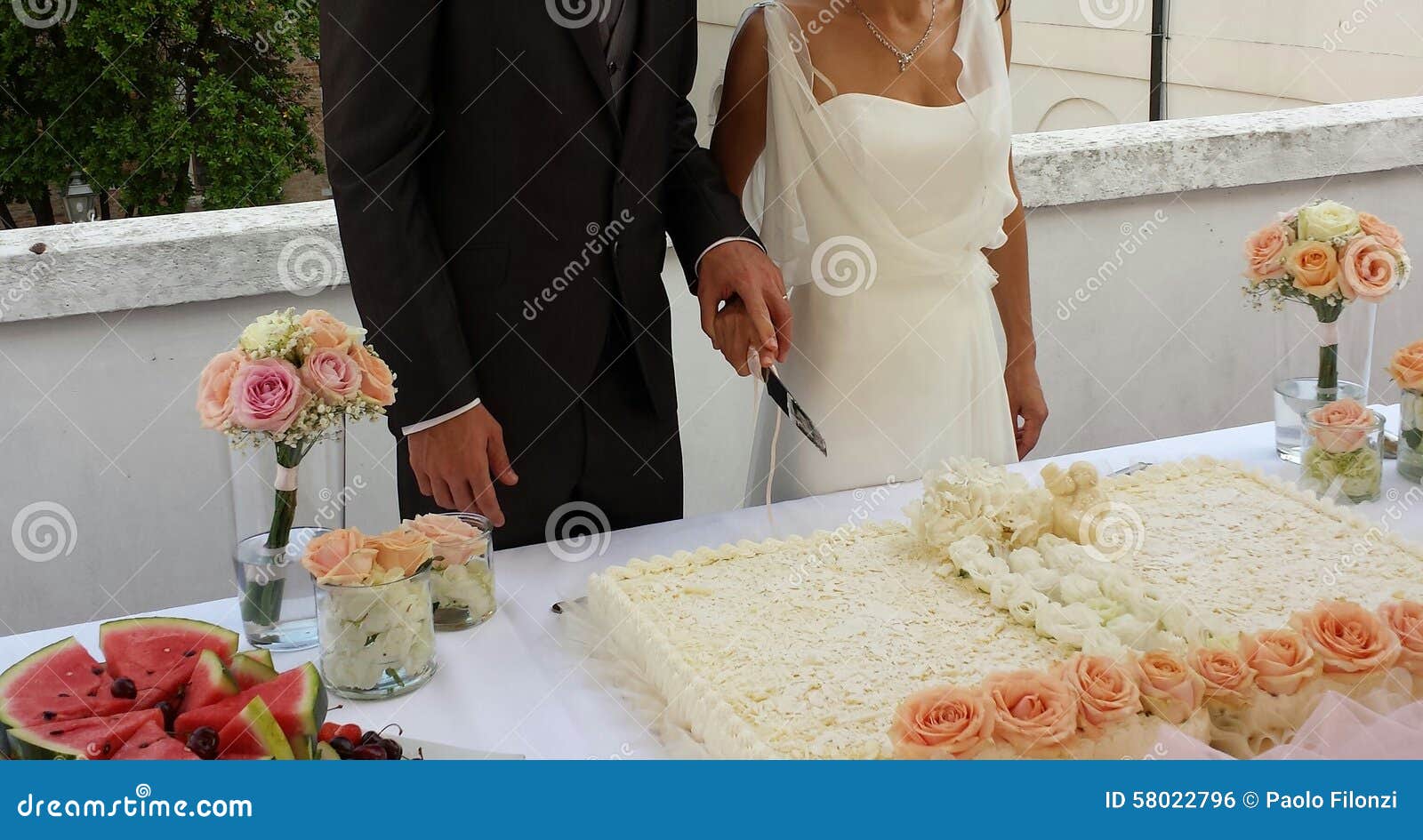 Cutting the wedding cake stock photo. Image of celebration - 58022796