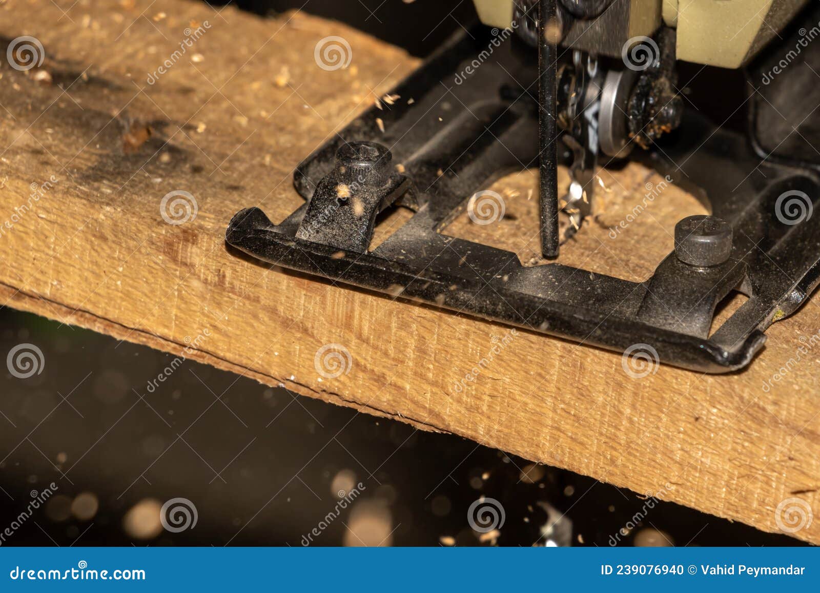 Jigsaw is Cutting Timber with Wood Chips Stock Photo - Image of ...