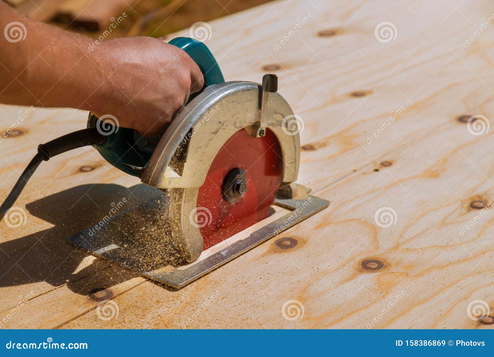 Cutting Wood Using an Electrical Chain Saw Professional Tools Stock ...
