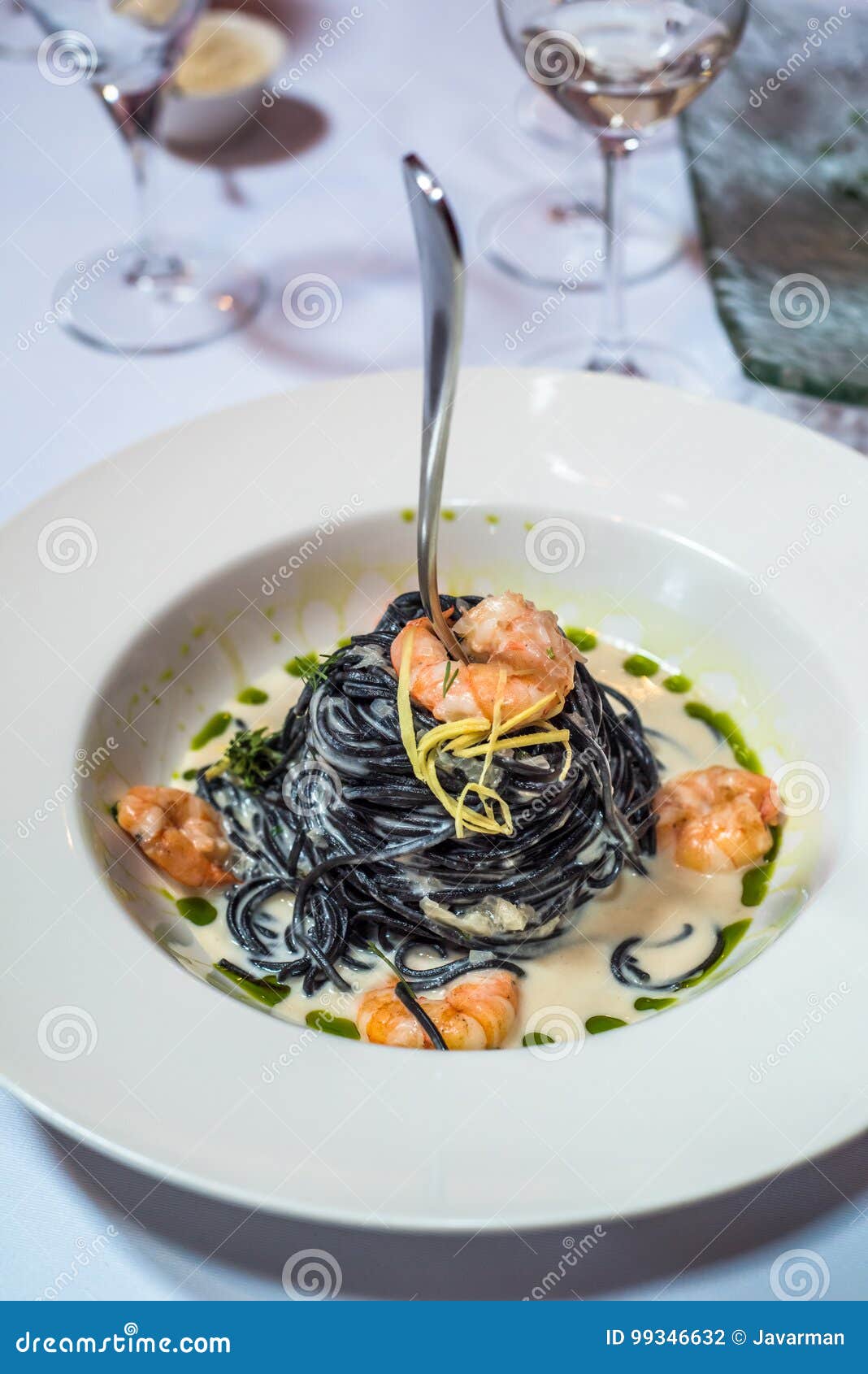 Cuttlefish Ink Spaghetti with Prawns Stock Photo - Image of dinner ...