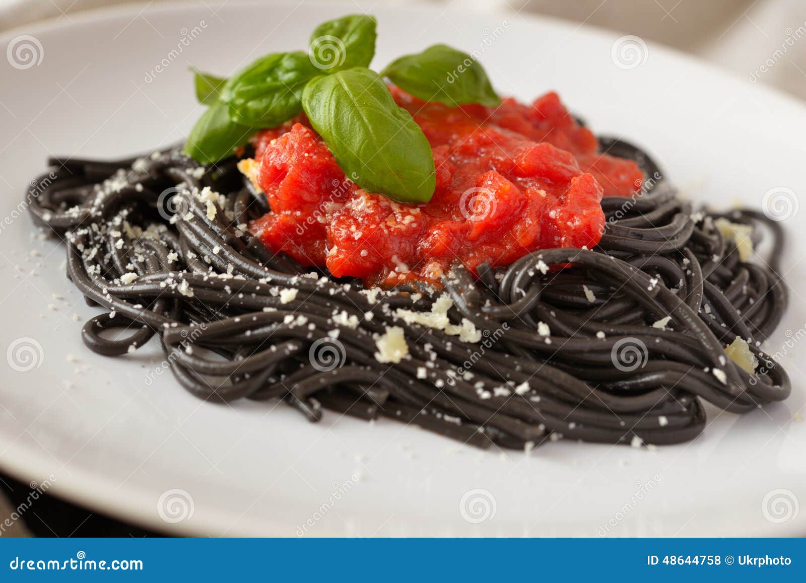 Cuttlefish Ink Spaghetti Under Tomato Sauce Stock Photo - Image of ...