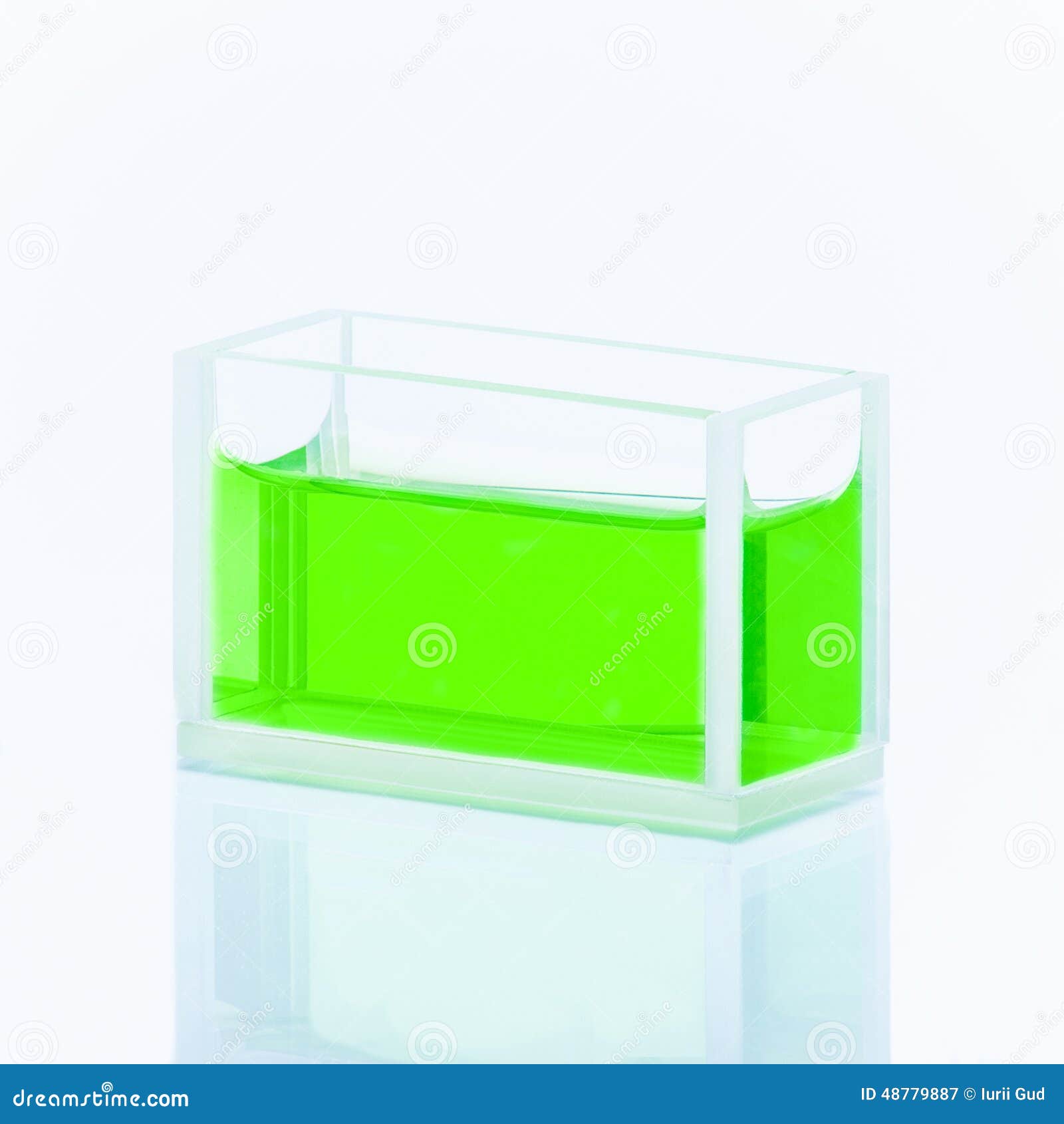 Cuvette with green liquid stock image. Image of electro - 48779887