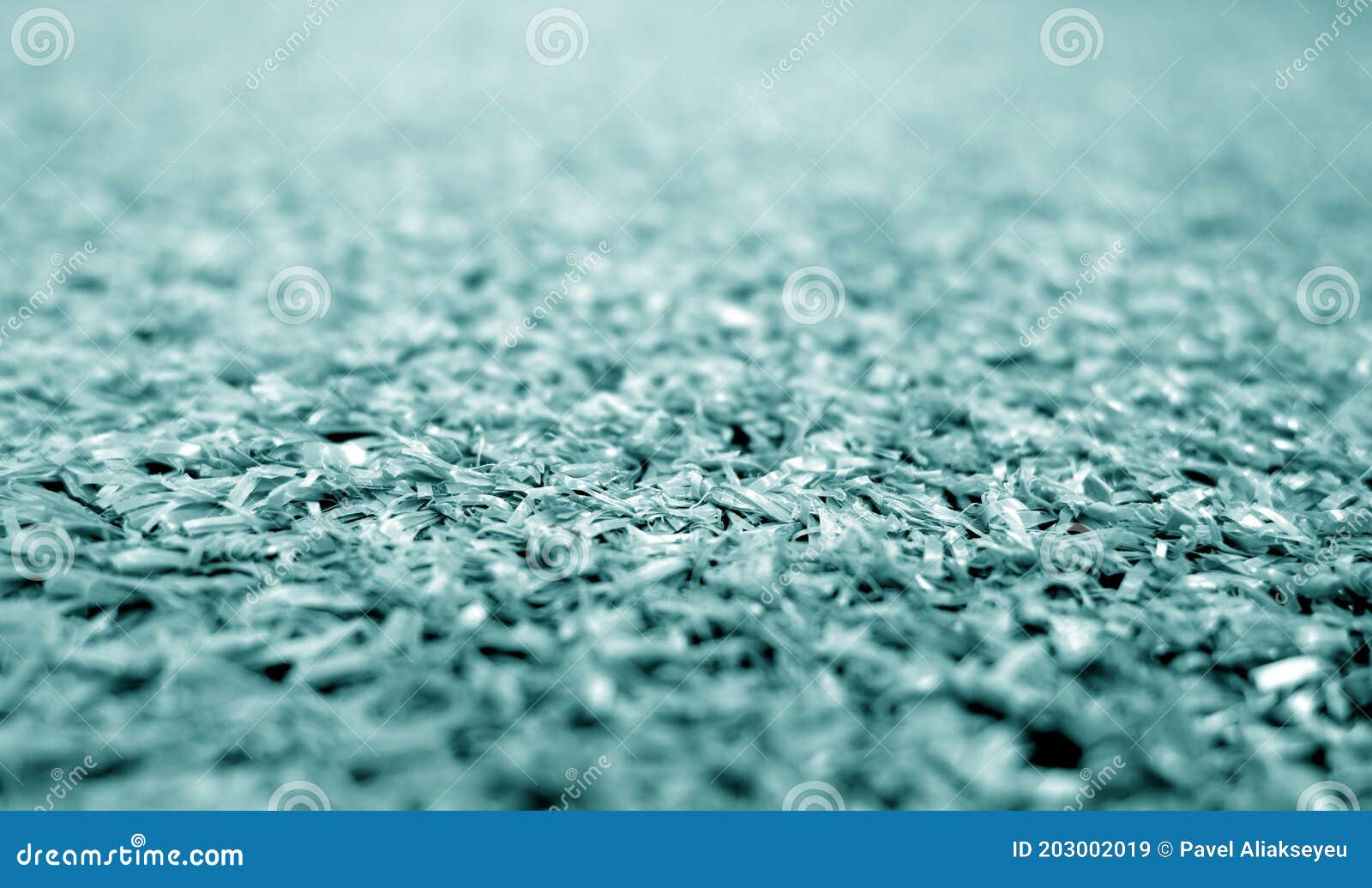 Cyan Color Artificial Grass Close-up with Blur Background Stock Image ...
