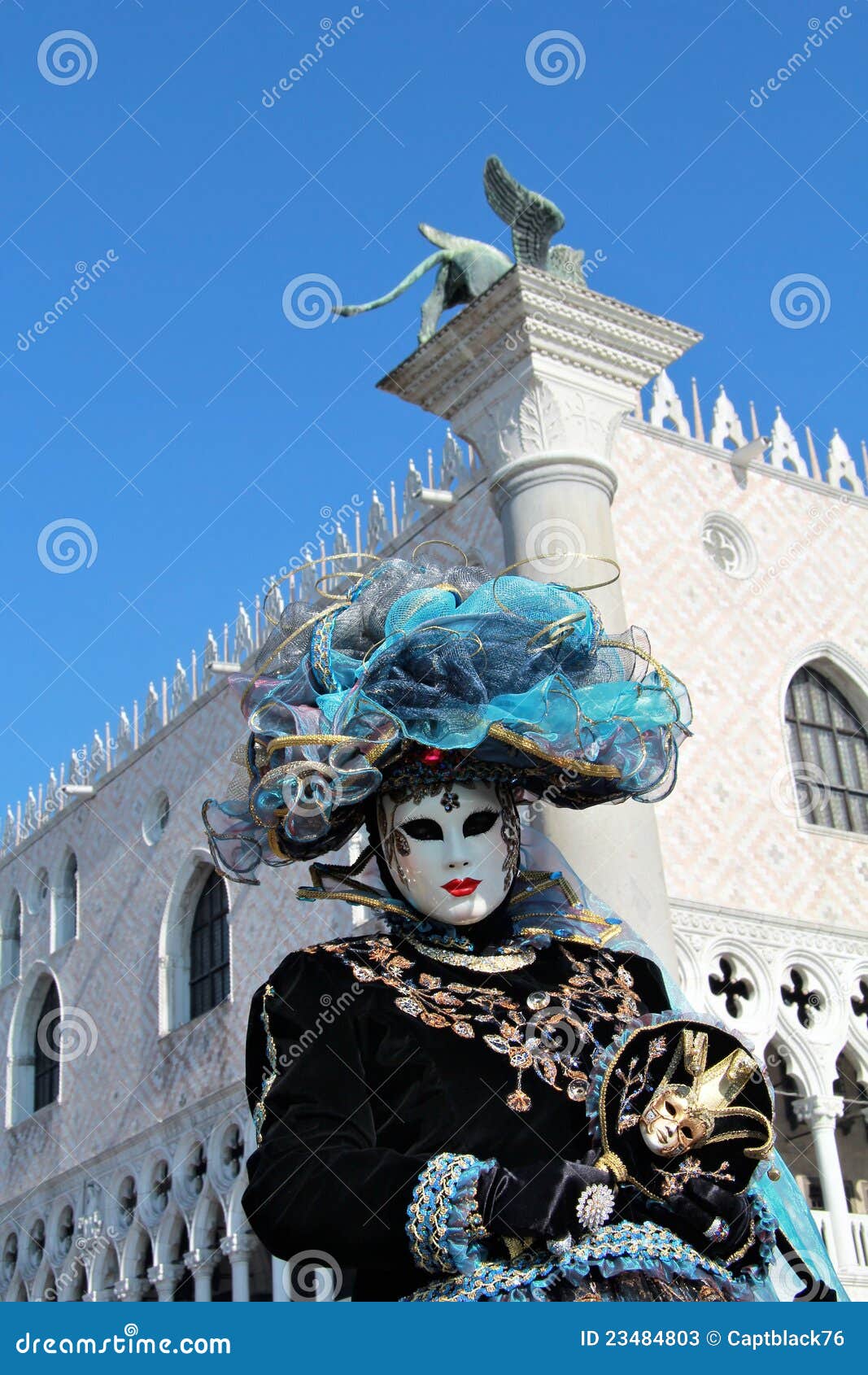 Cyan Mask Under Winged Lion Pillar Stock Image - Image of dress ...