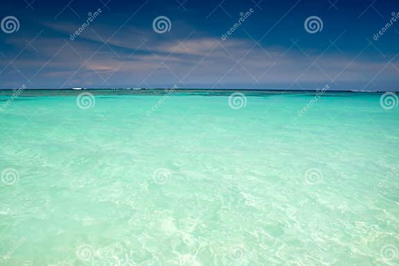 Cyan Ocean Under Blue Sky with Clouds Stock Photo - Image of blue ...