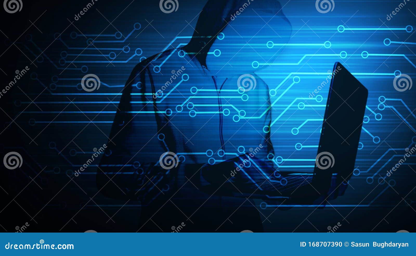 Hacker In Hoodie And Mask Trying To Cyber Attack Using Laptop, Internet ... Hacker In Hoodie And Mask Trying To Cyber Attack Using Laptop, Internet ...