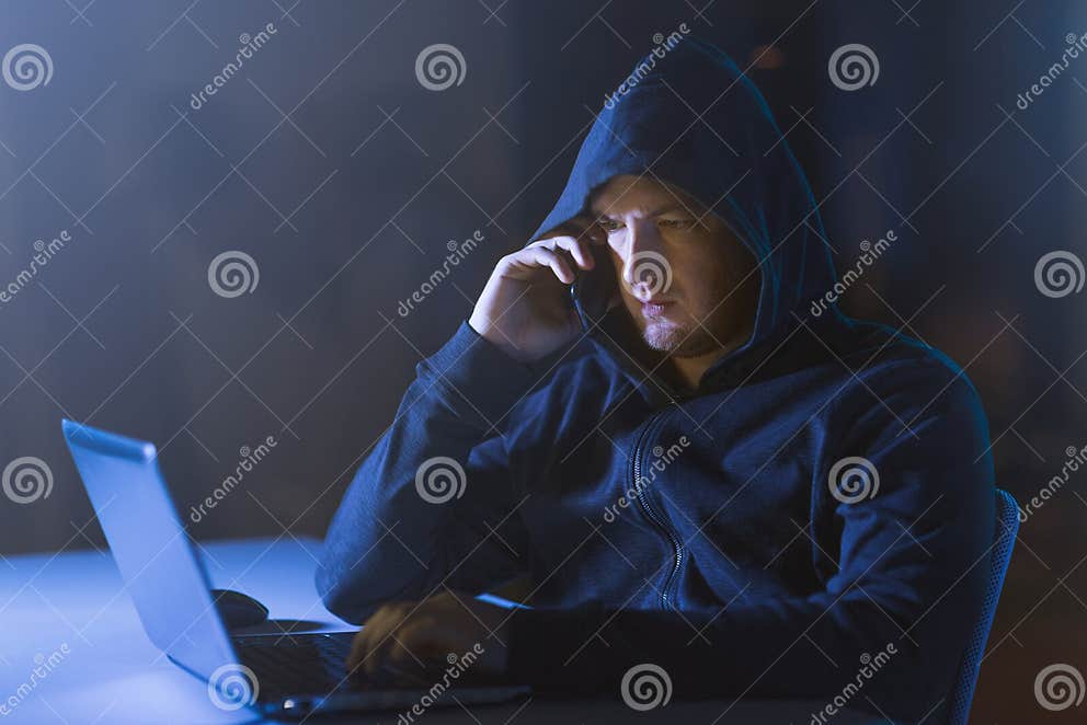 Hacker with Laptop Calling on Cellphone Stock Image - Image of hack ...