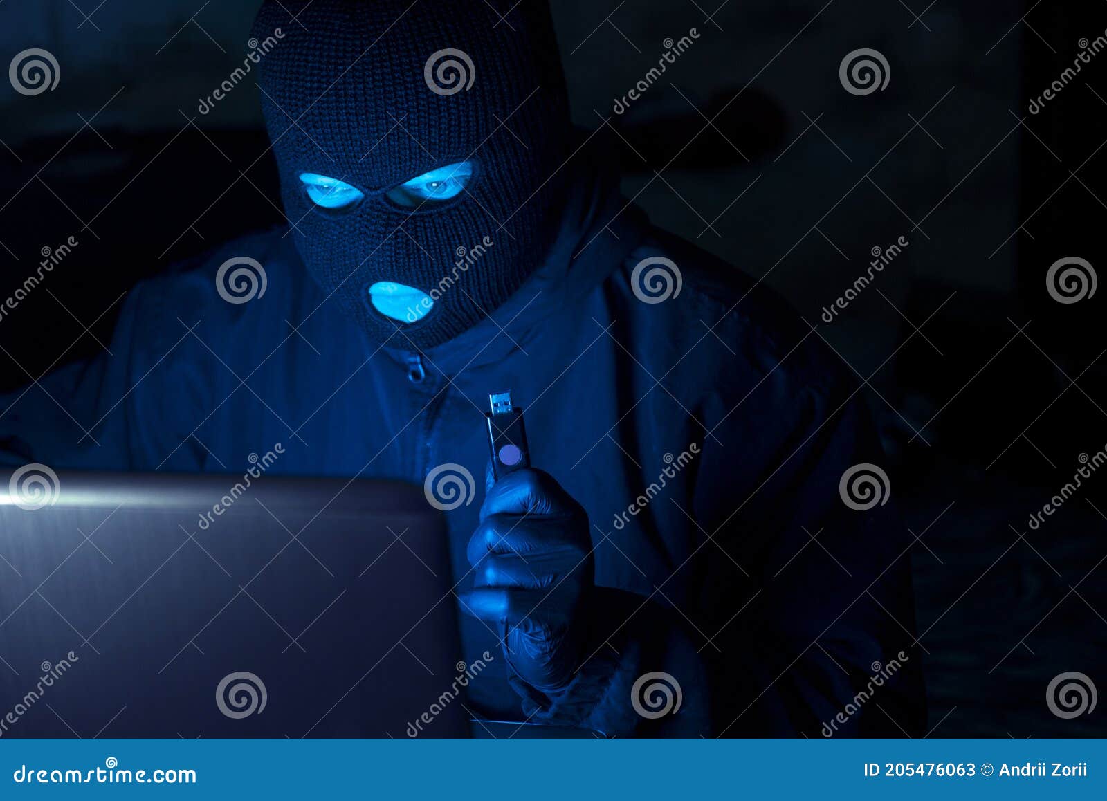 Cybercrime, Hacking and Technology Crime. Masked Hacker Working in the ...