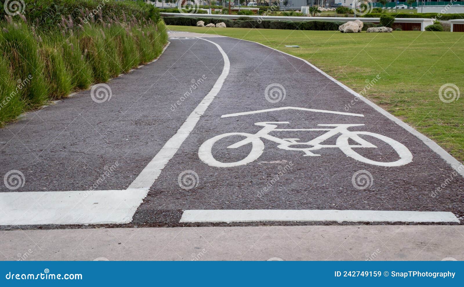 Cycle Lane Markings on a Pathway through a Public Park Stock Image ...