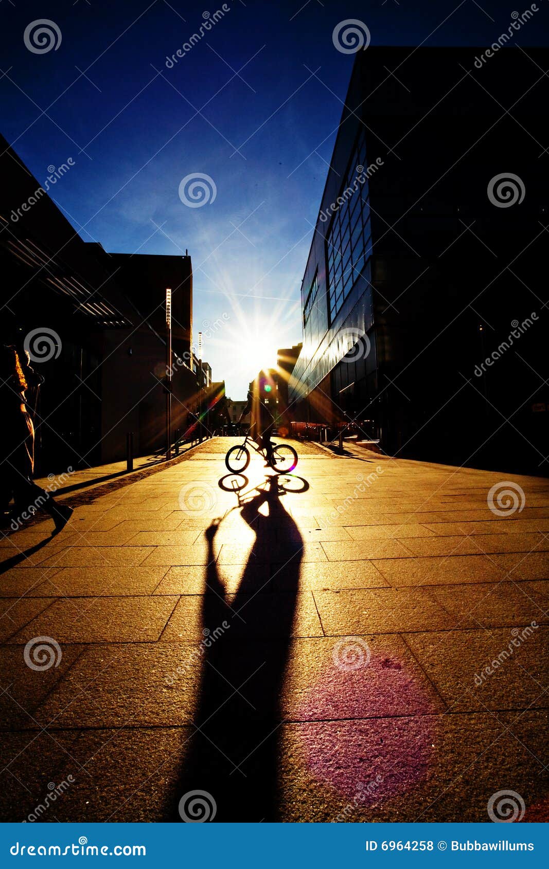 Cycle Shadow stock photo. Image of dramatic, bricks, town - 6964258