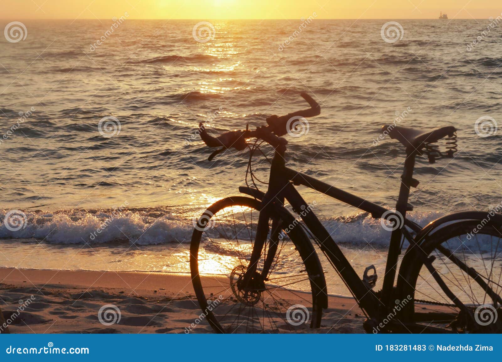 Cycling Along the Sea Coast, Bicycle at Sunset Stock Image - Image of ...