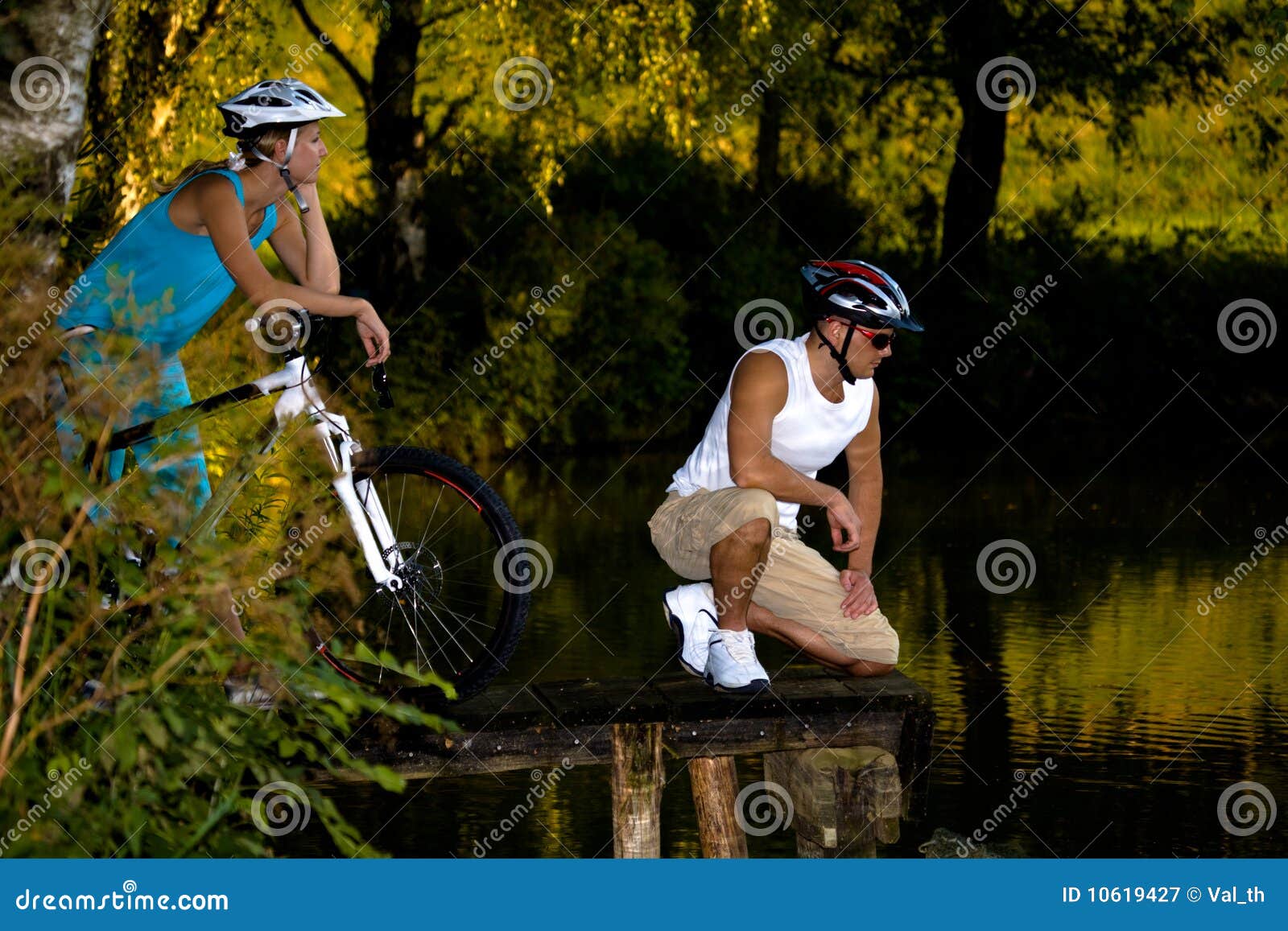 Cycling couple stock image. Image of summer, biking, drink - 10619427