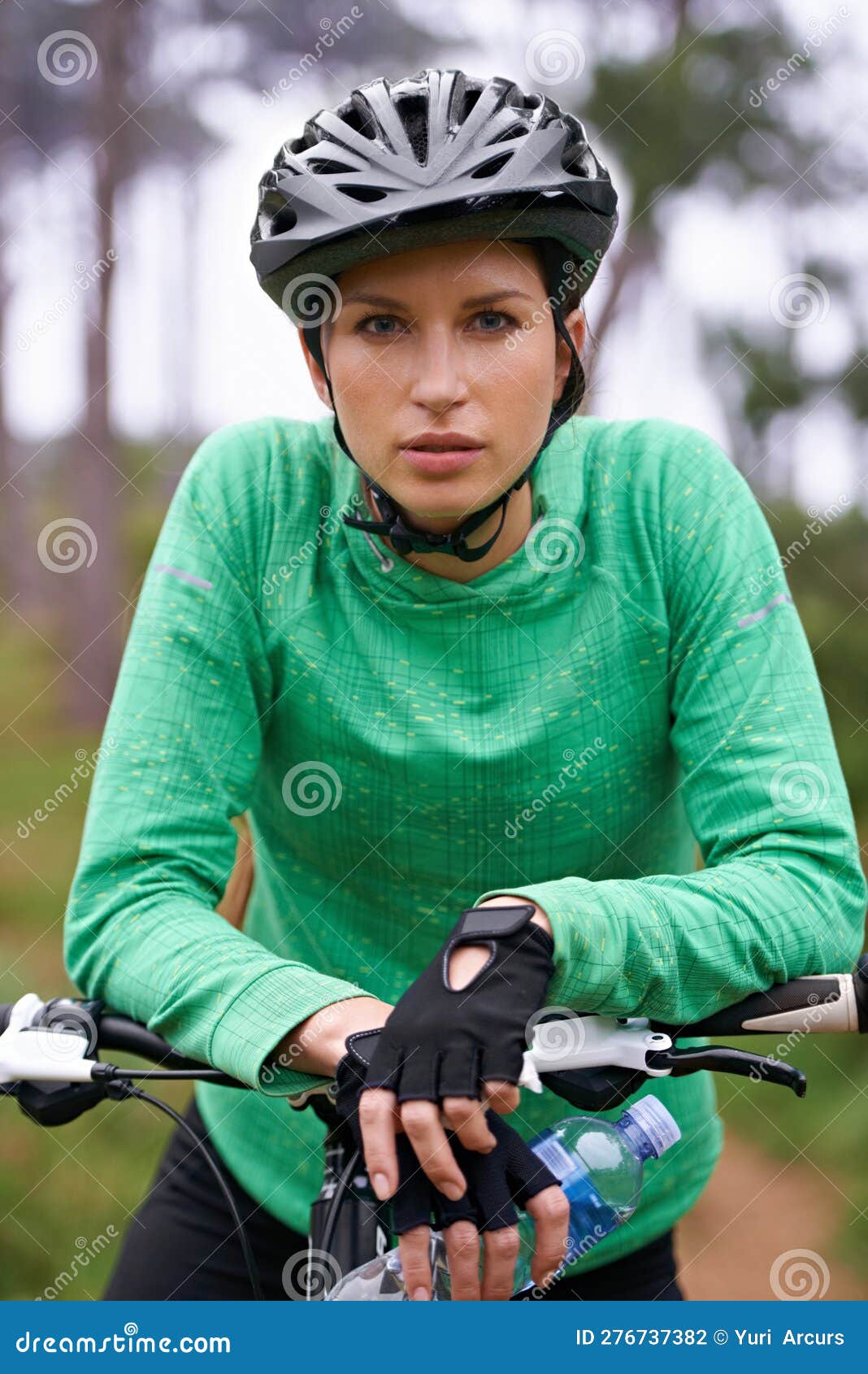 Cycling Keeps Me in Great Shape. an Attractive Young Woman Cycling ...